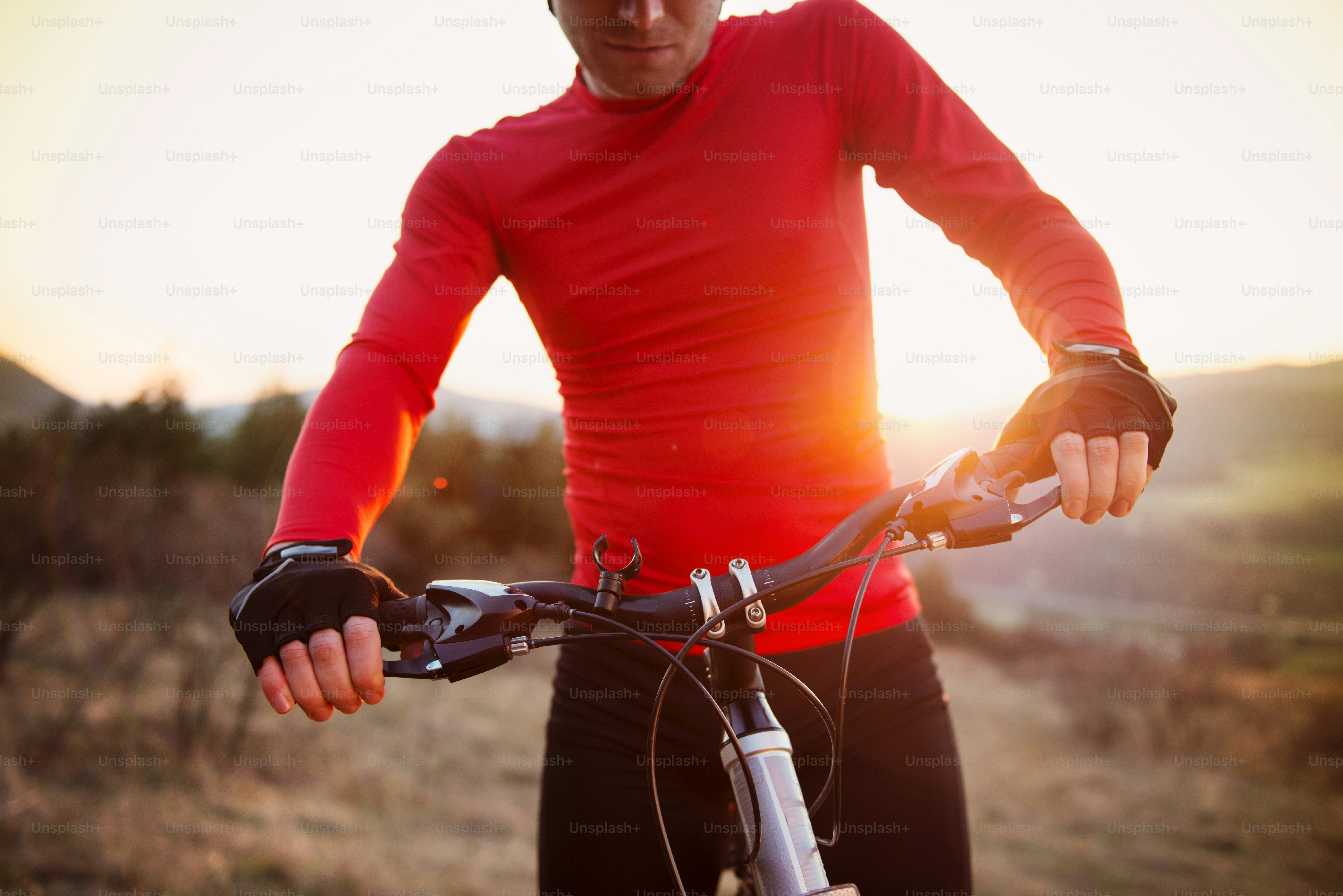 Detail of cyclist man feet riding mountain bike on outdoor trail in ...