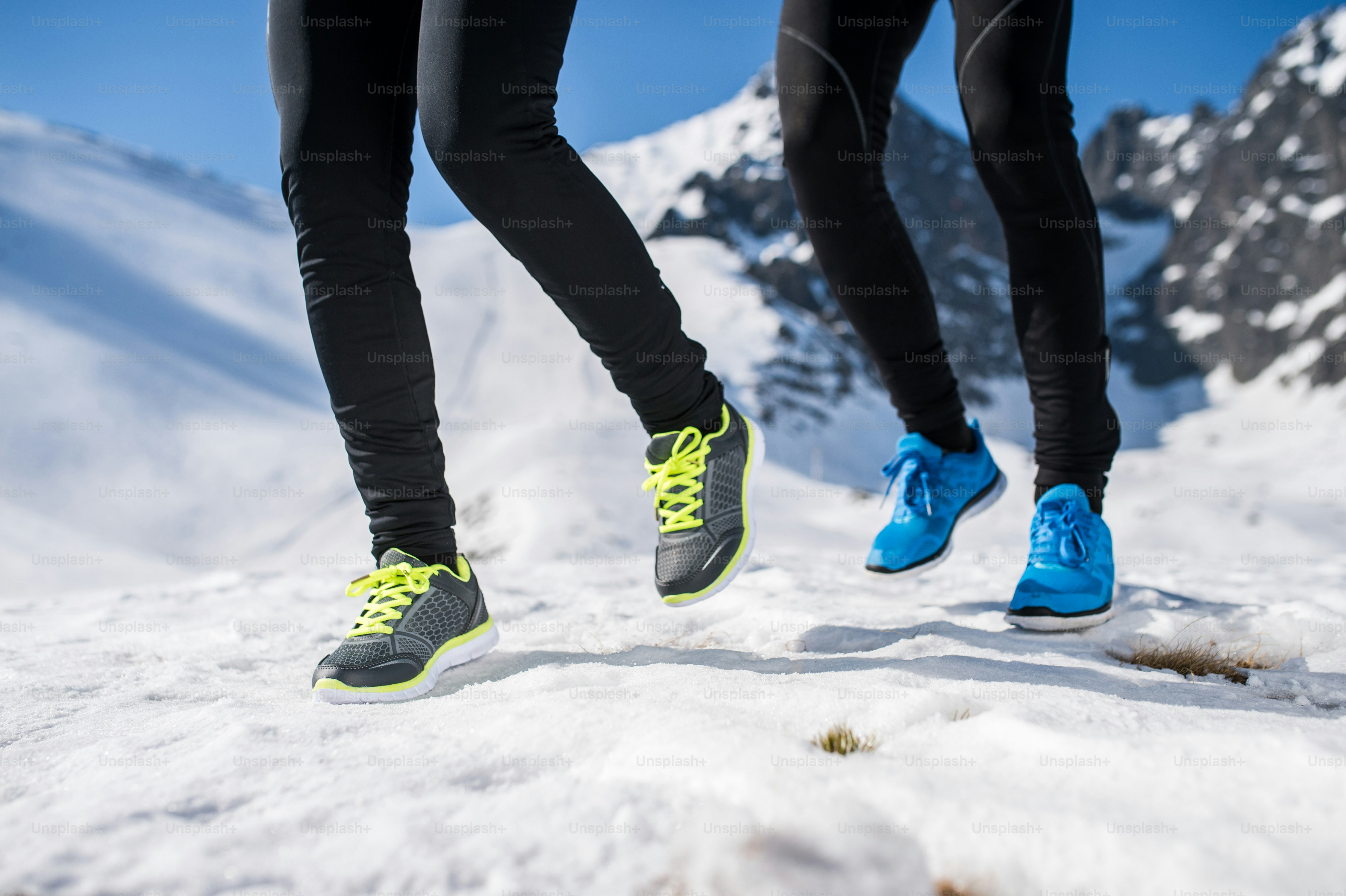 Legs of two runners outside in winter nature photo – Exercising Image ...