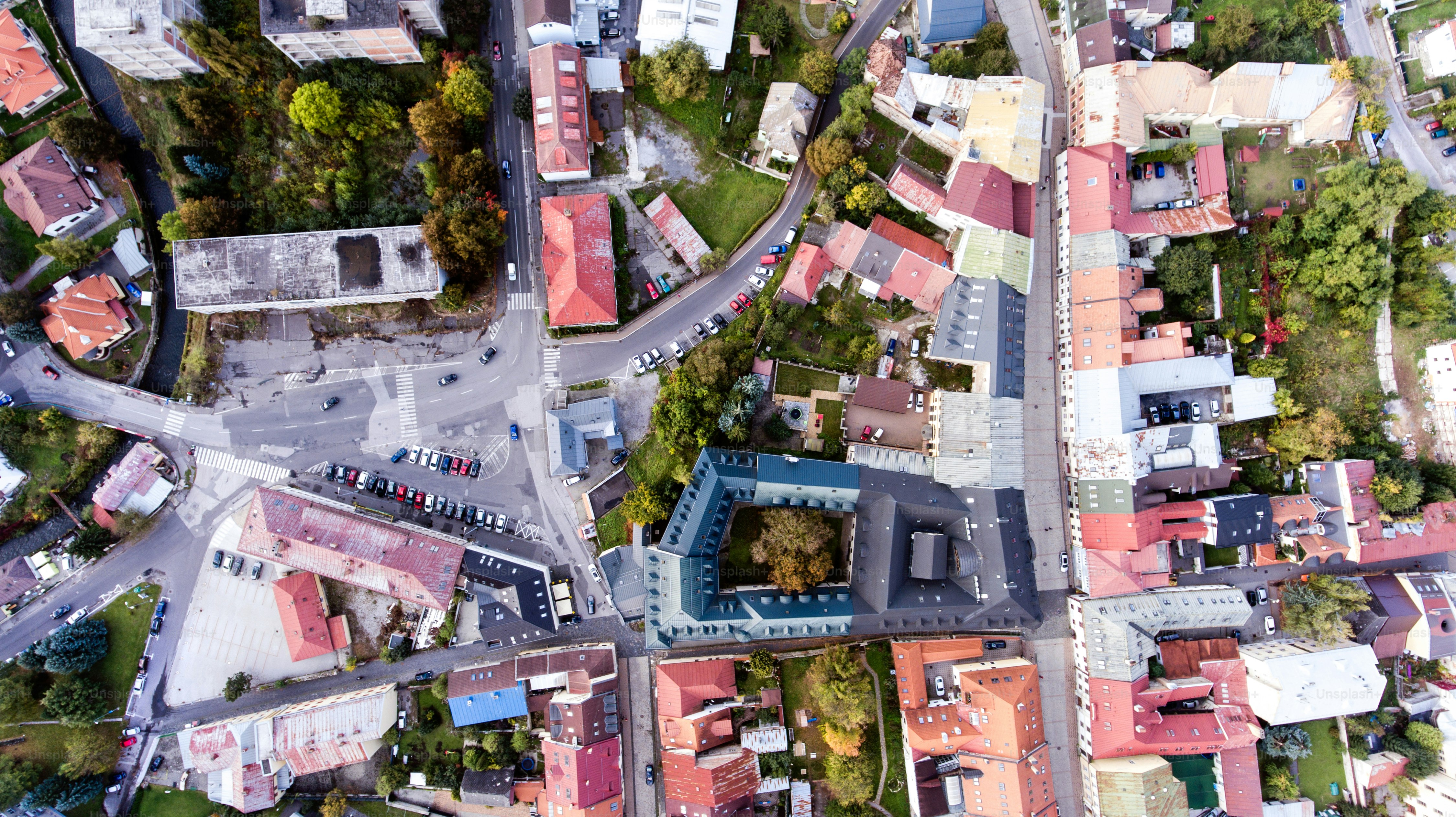 Aerial view of slovak town Banska Bystrica surrounded by green hills ...