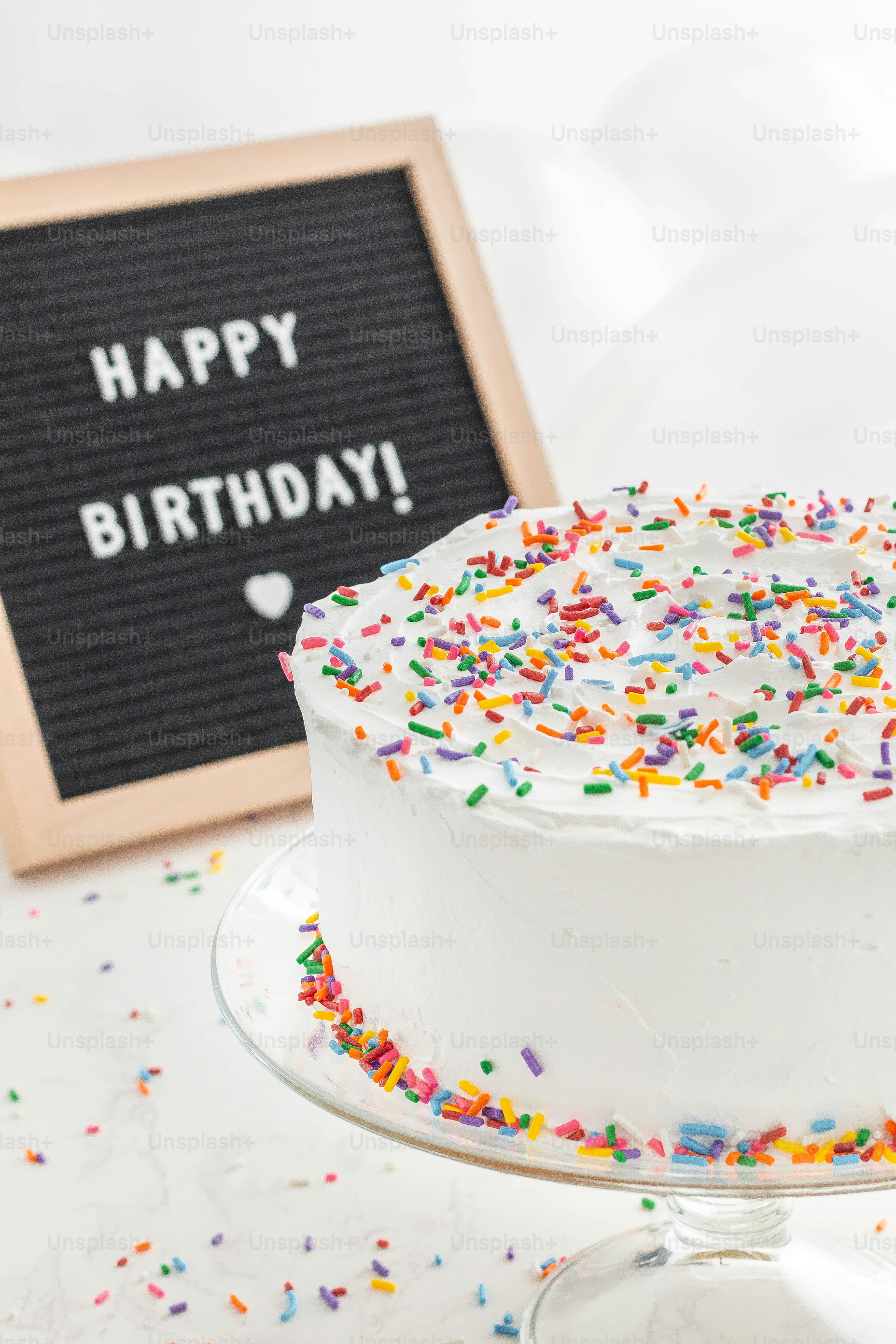 A birthday cake with sprinkles and a chalkboard sign photo – Sprinkle ...
