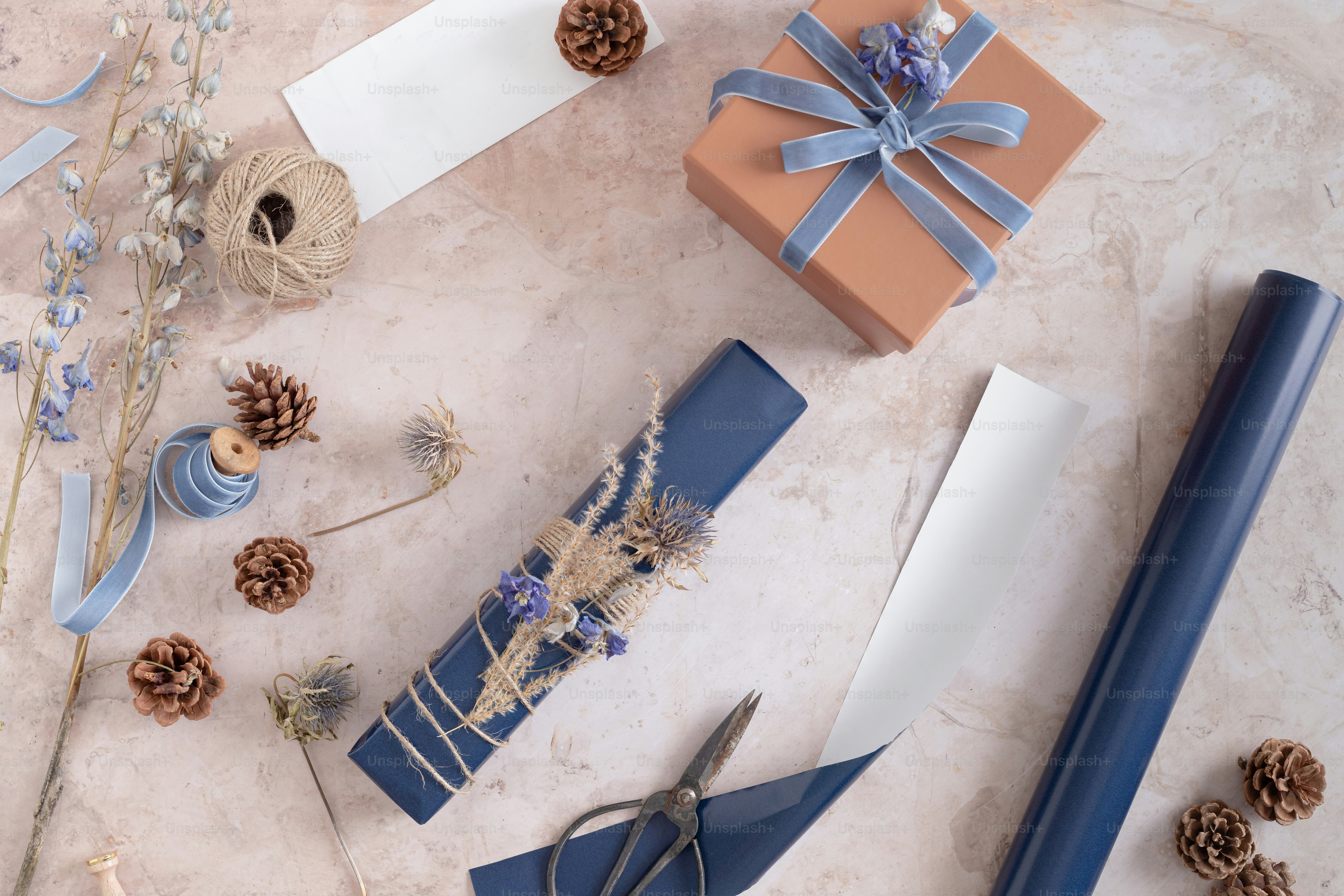 A table topped with lots of different types of wrapping paper photo ...