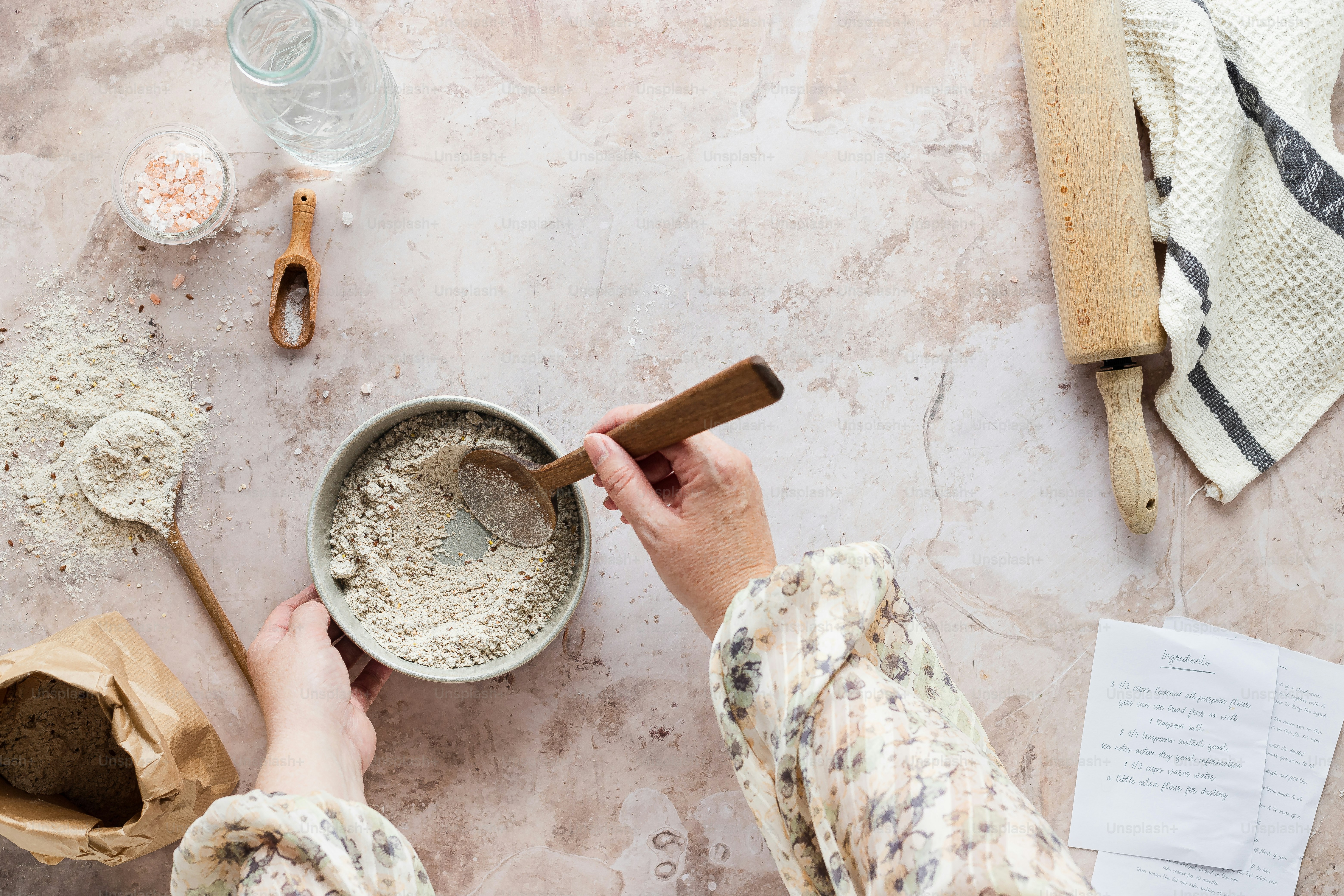 A person mixing a mixture in a bowl photo – Baked bread Image on Unsplash
