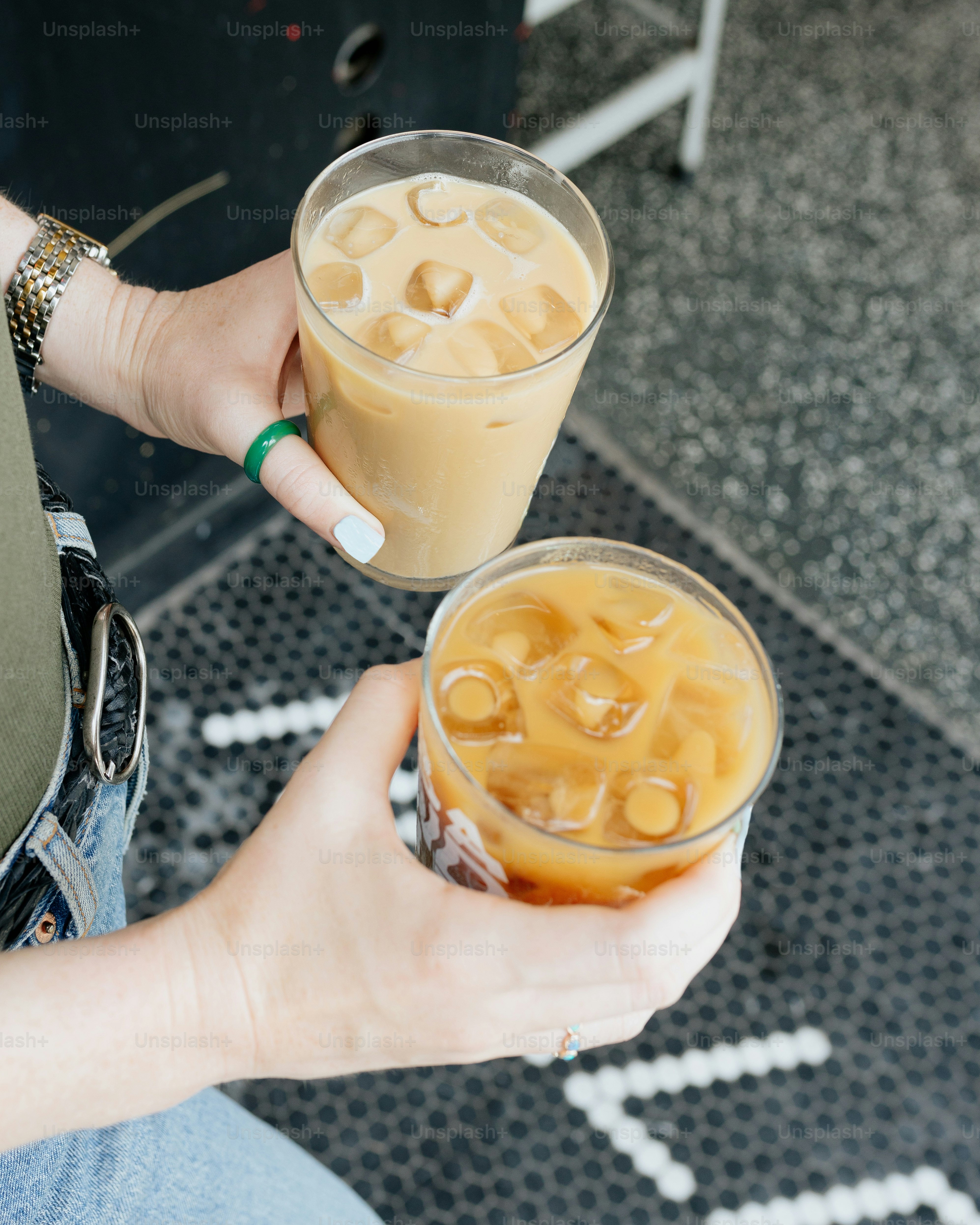 A person holding a drink in their hand photo – Cold coffee Image on ...