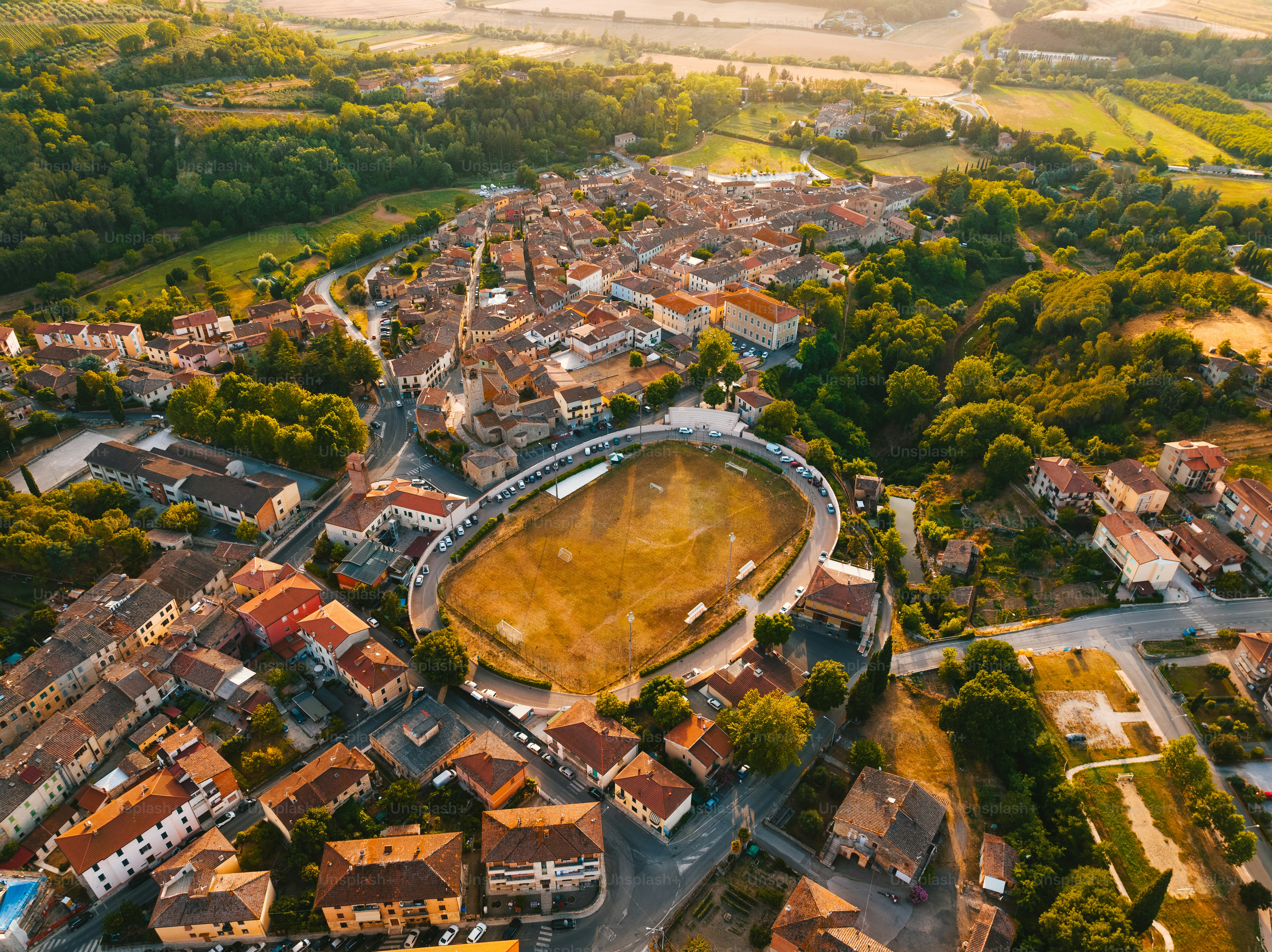 An aerial view of a city with lots of buildings photo – Allotment Image ...