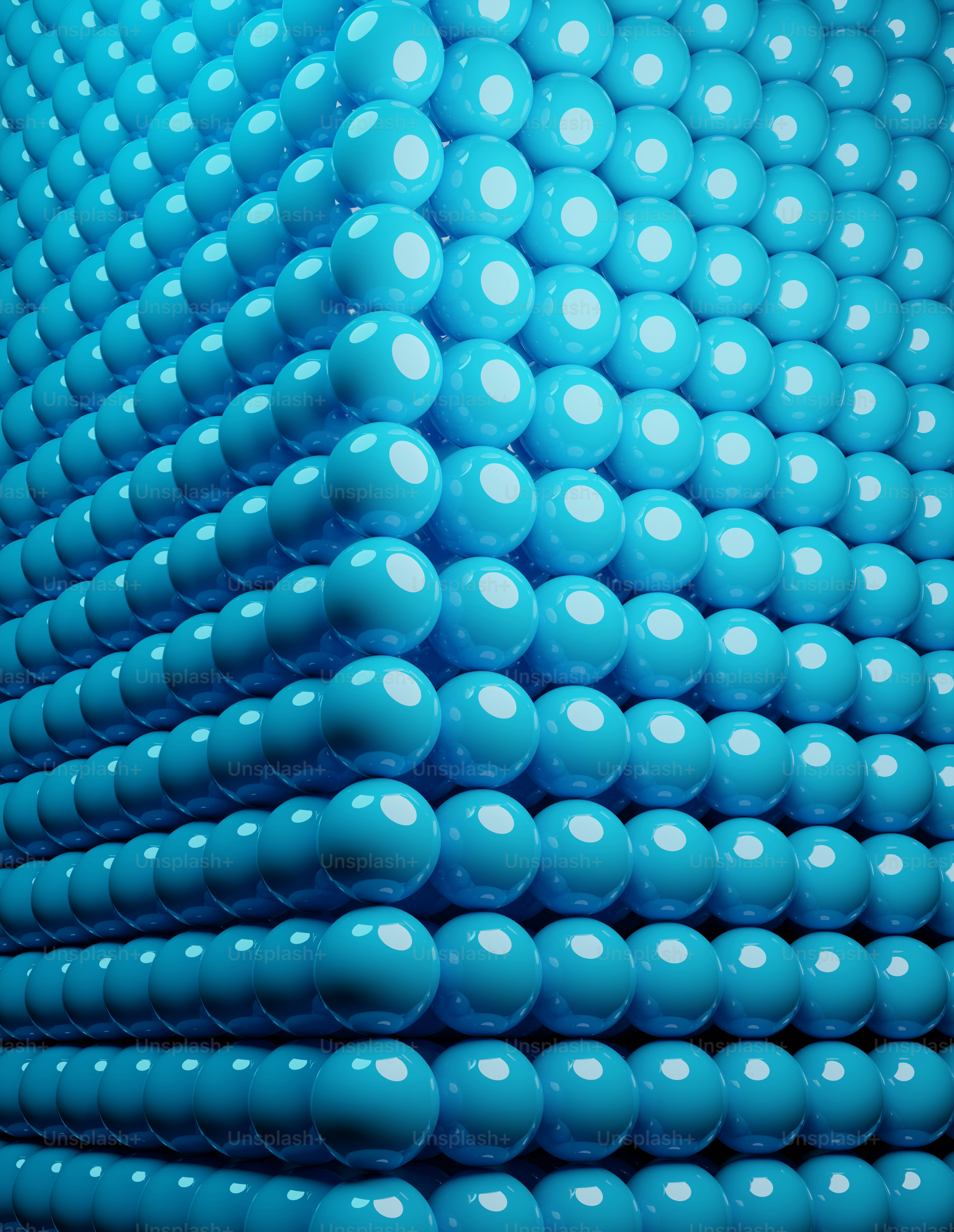 A large group of blue balls in the shape of a pyramid photo – Digital ...