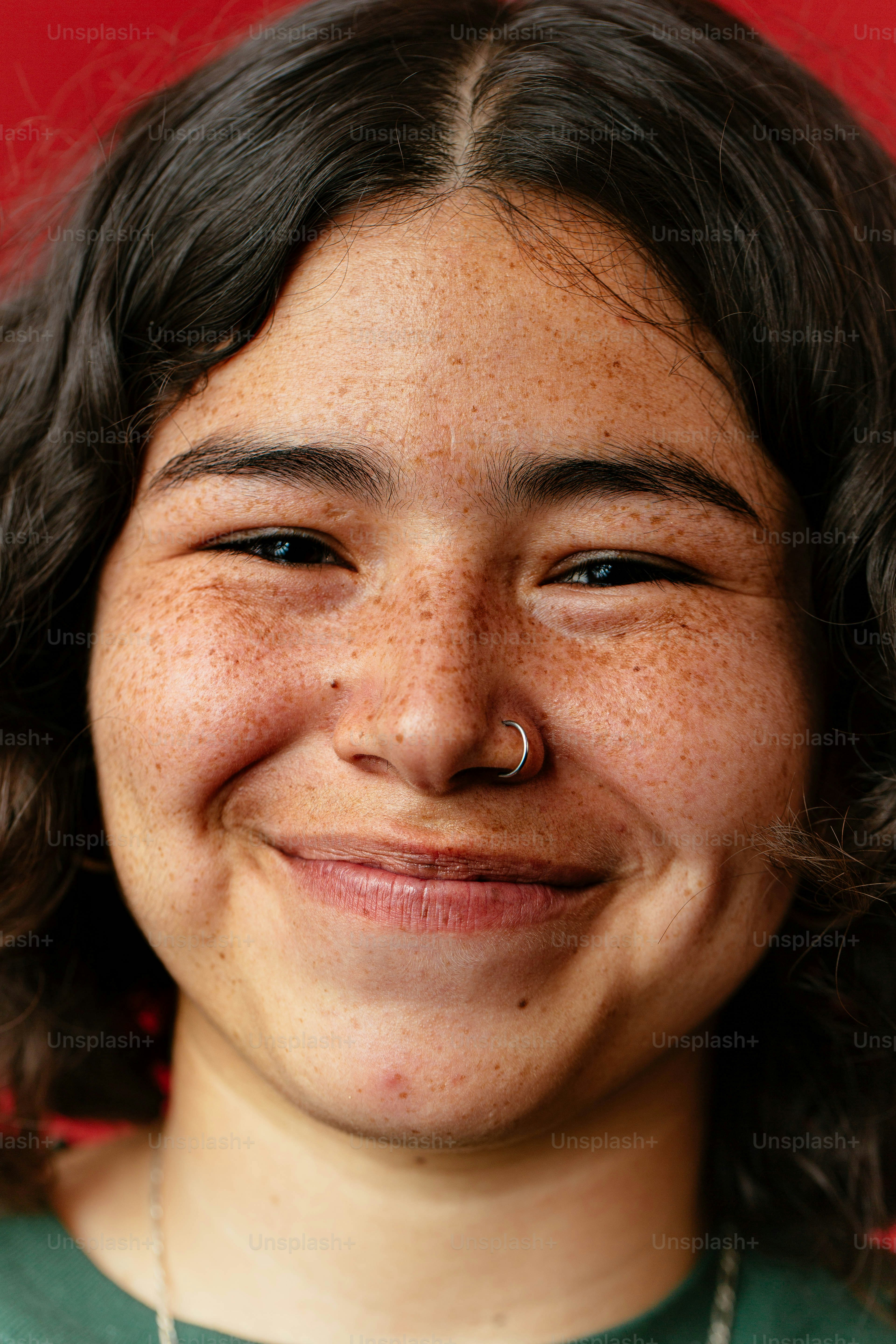 A close up of a person with freckles on photo – Portrait Image on Unsplash