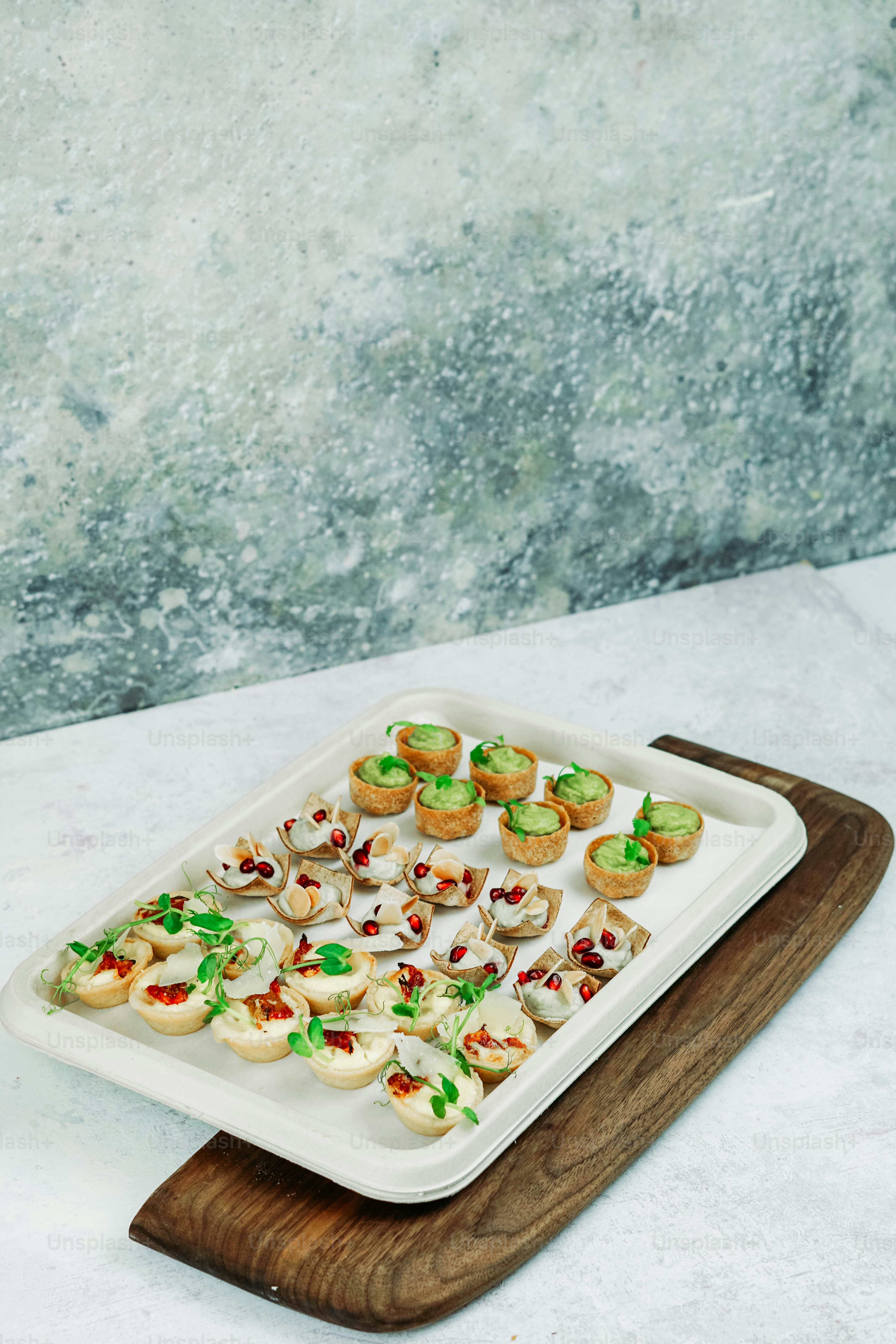 A platter of small appetizers on a table photo – Food Image on Unsplash