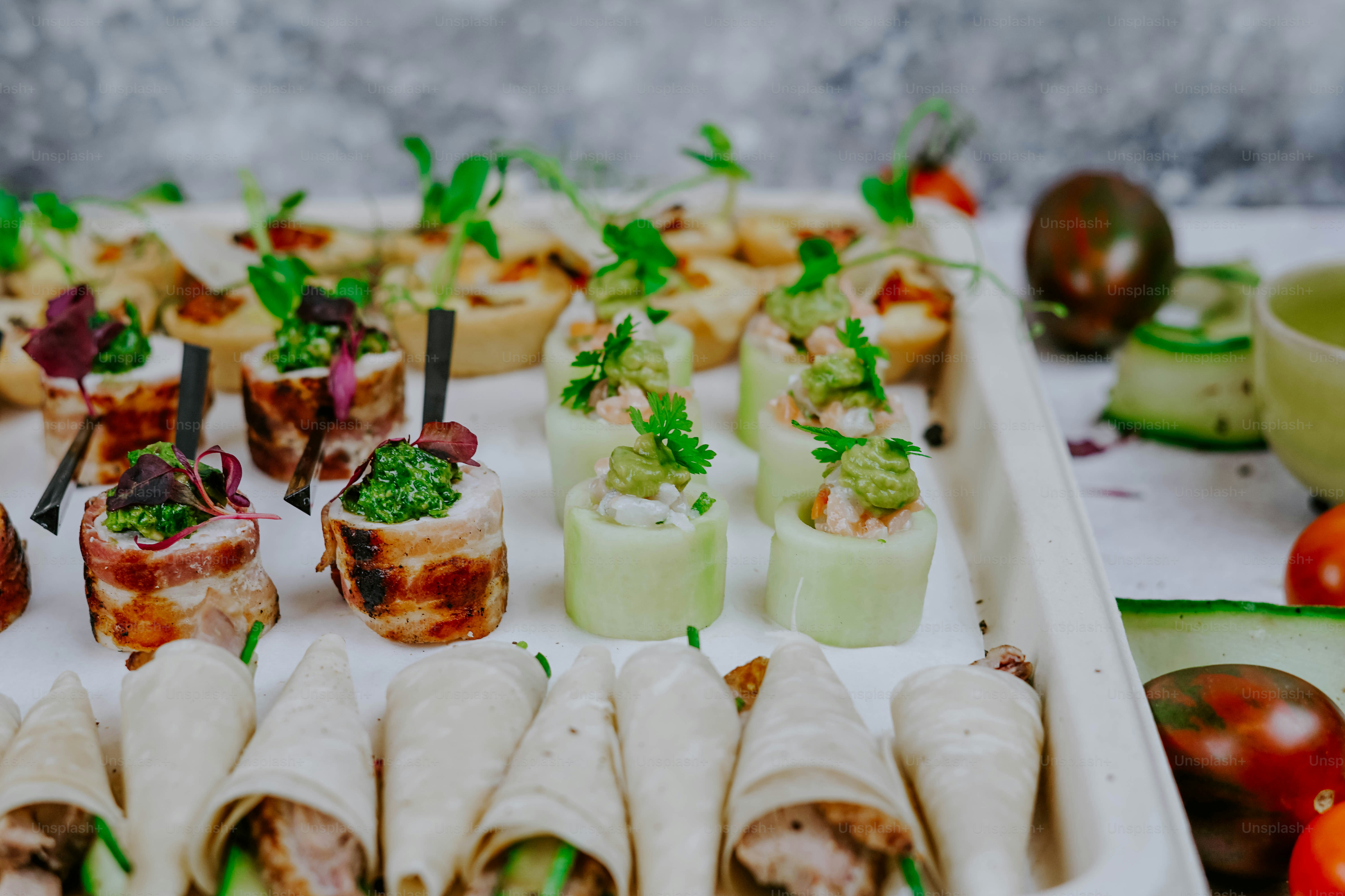 A tray filled with different types of appetizers photo – Finger food ...