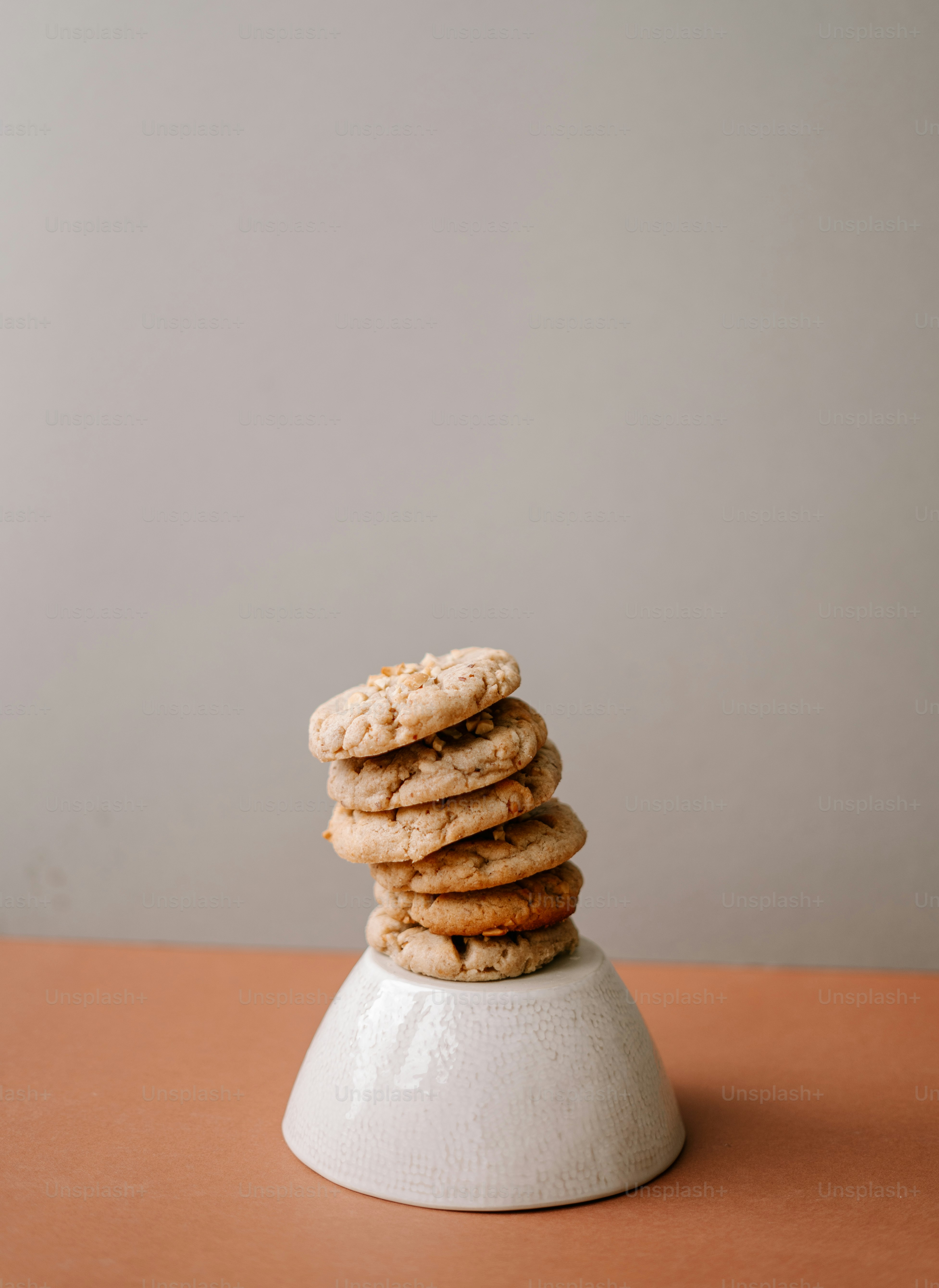 A stack of cookies sitting on top of a table photo – Food Image on Unsplash