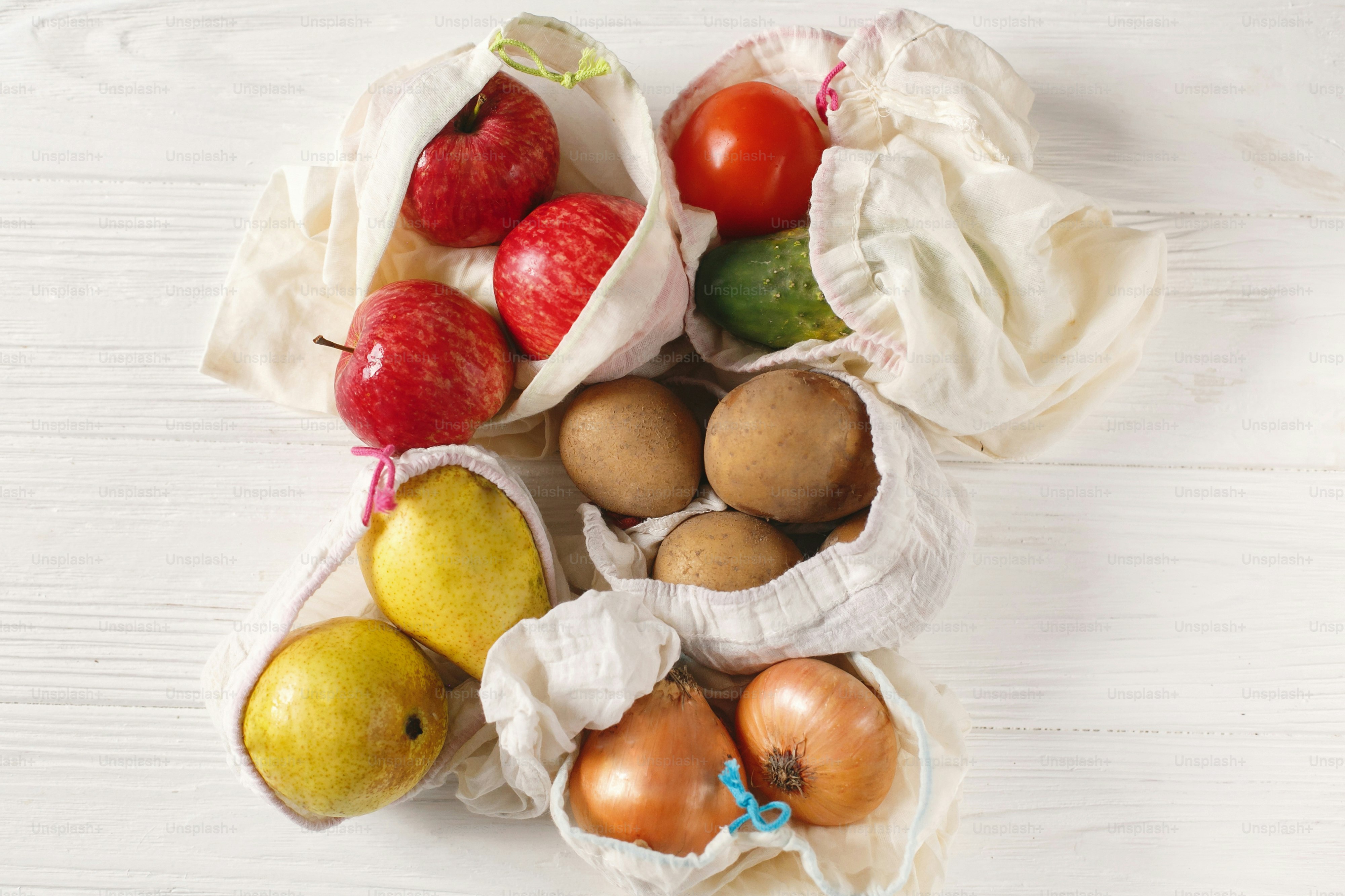 Zero waste food shopping. eco natural bags with fruits and vegetables ...