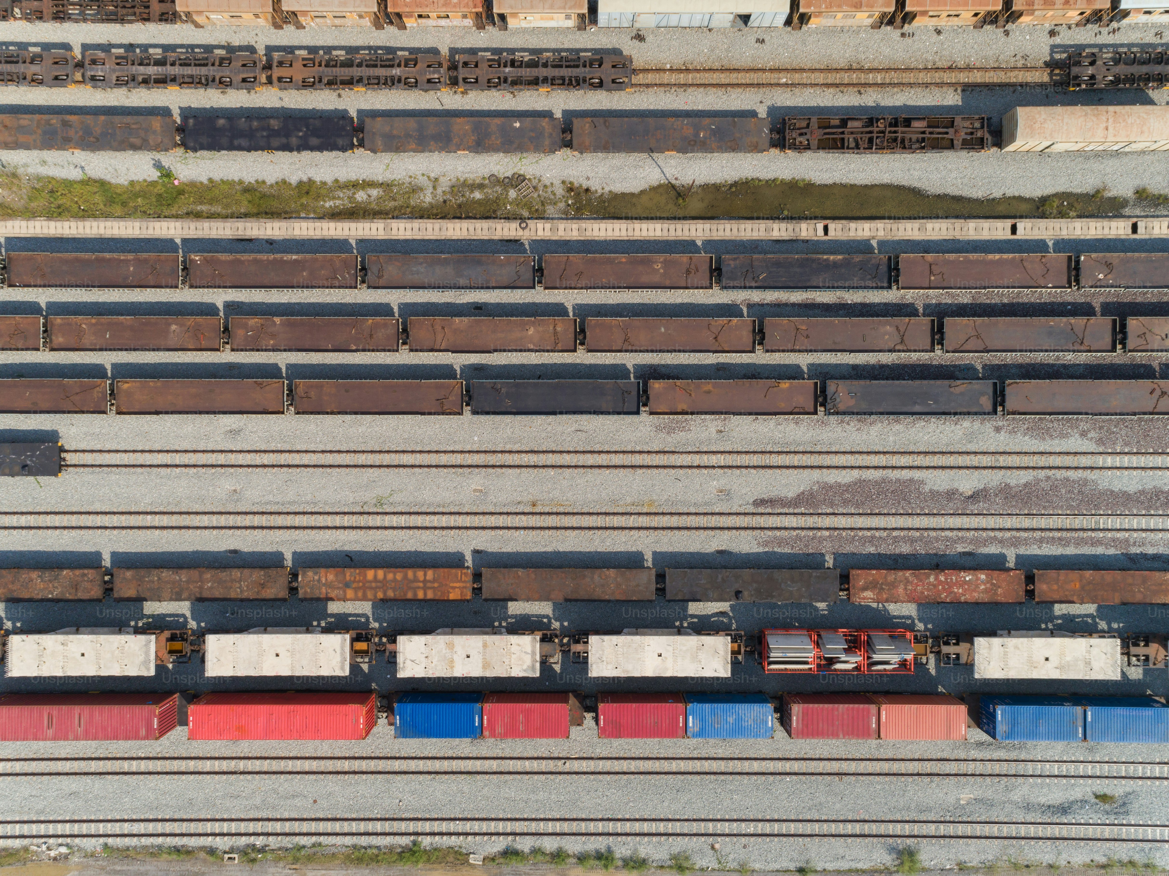 Aerial view train in container cargo warehouse for transportation ...