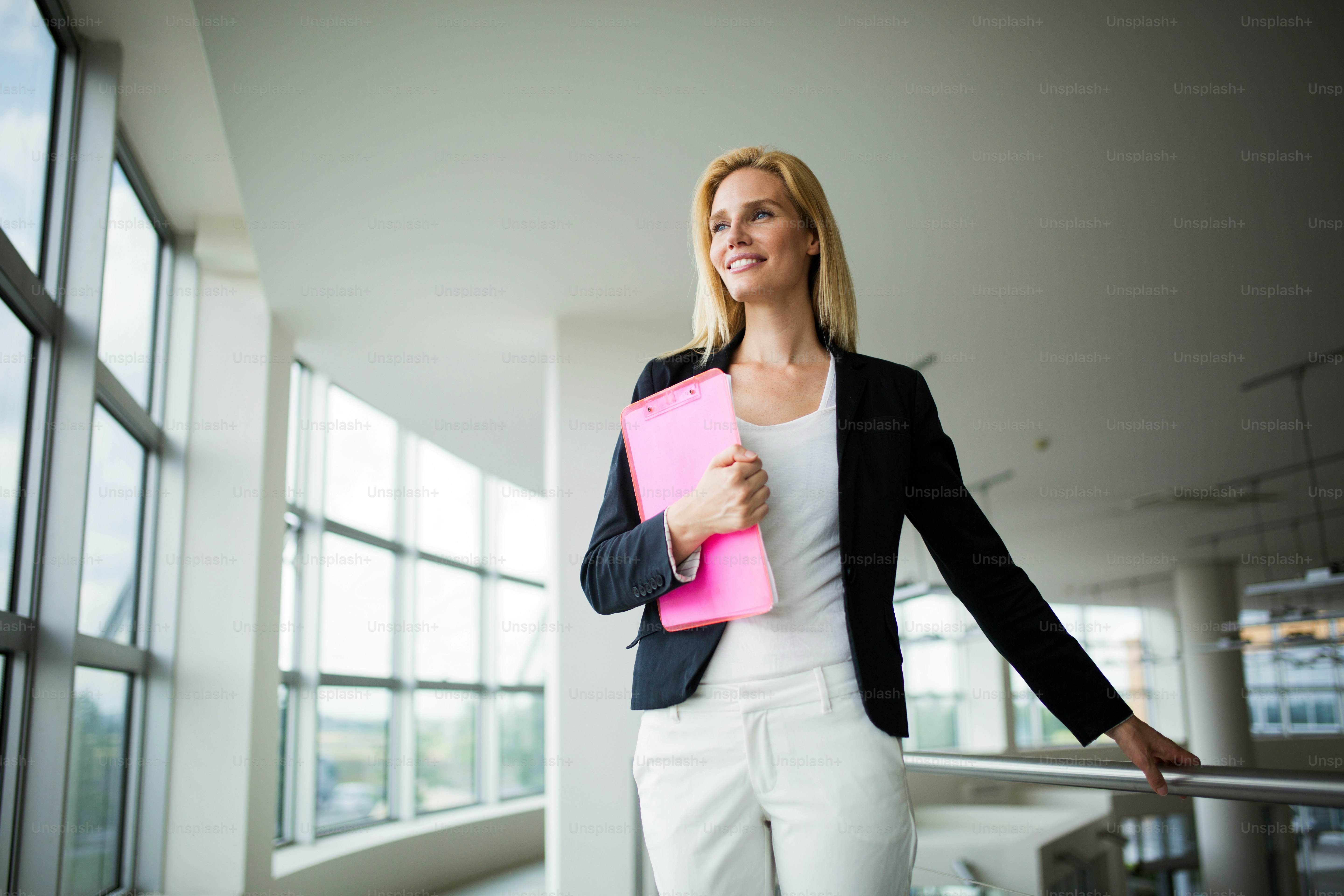 Happy smart business people celebrating success at company photo ...