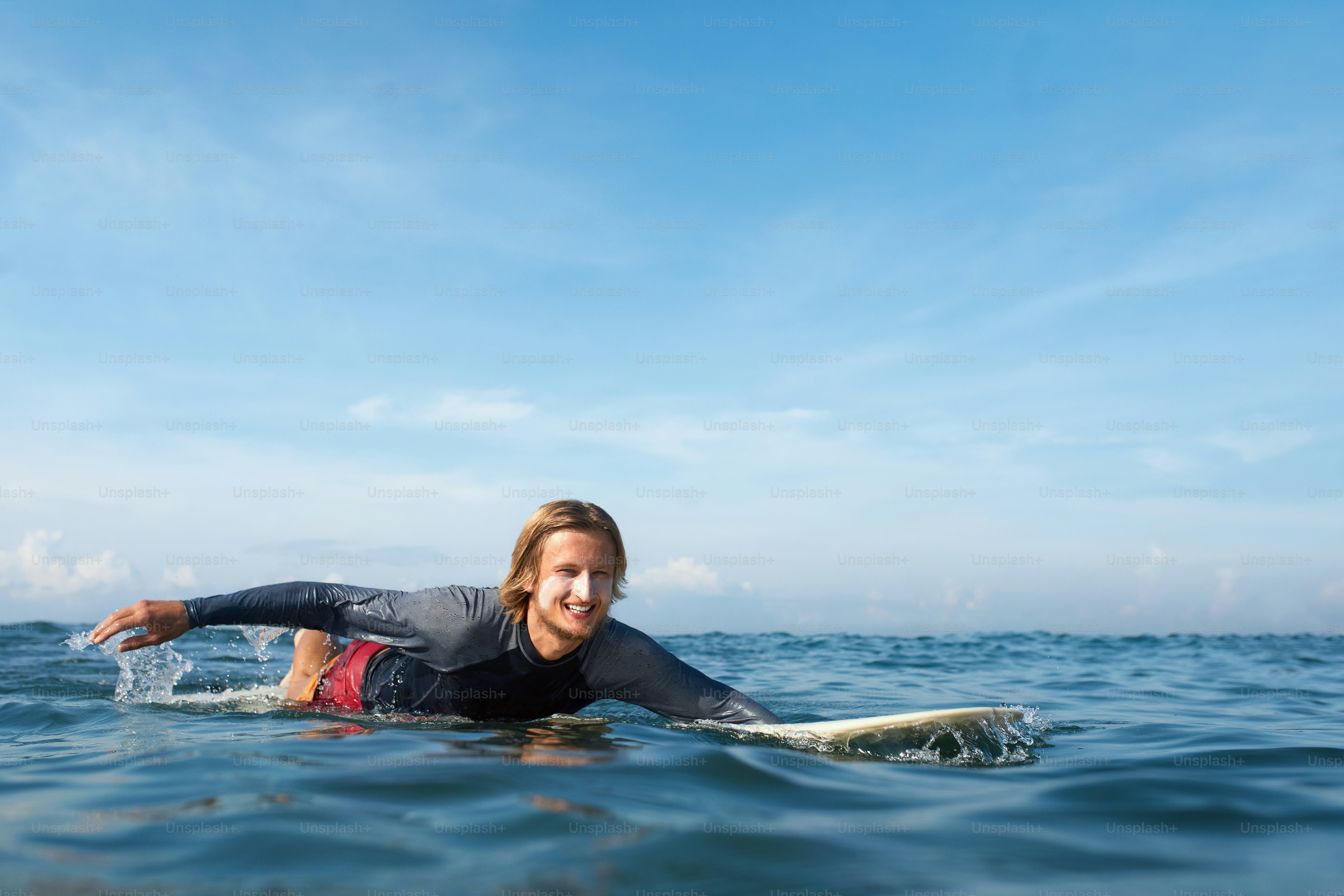 Surfer. Surfing Man On Surfboard Portrait. Smiling Guy In Wetsuit ...
