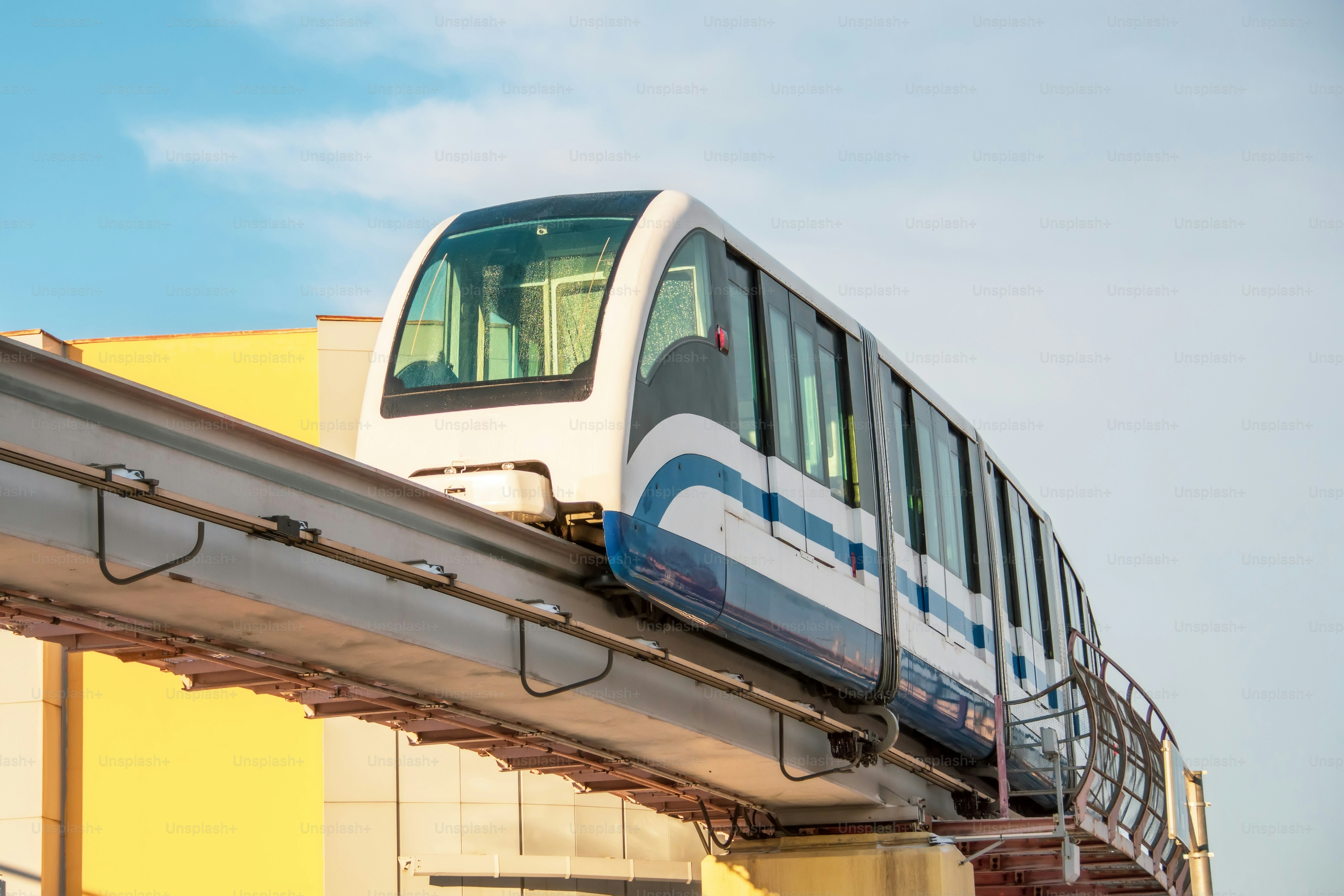 High speed subway train on the air bridge arrives at the station photo ...
