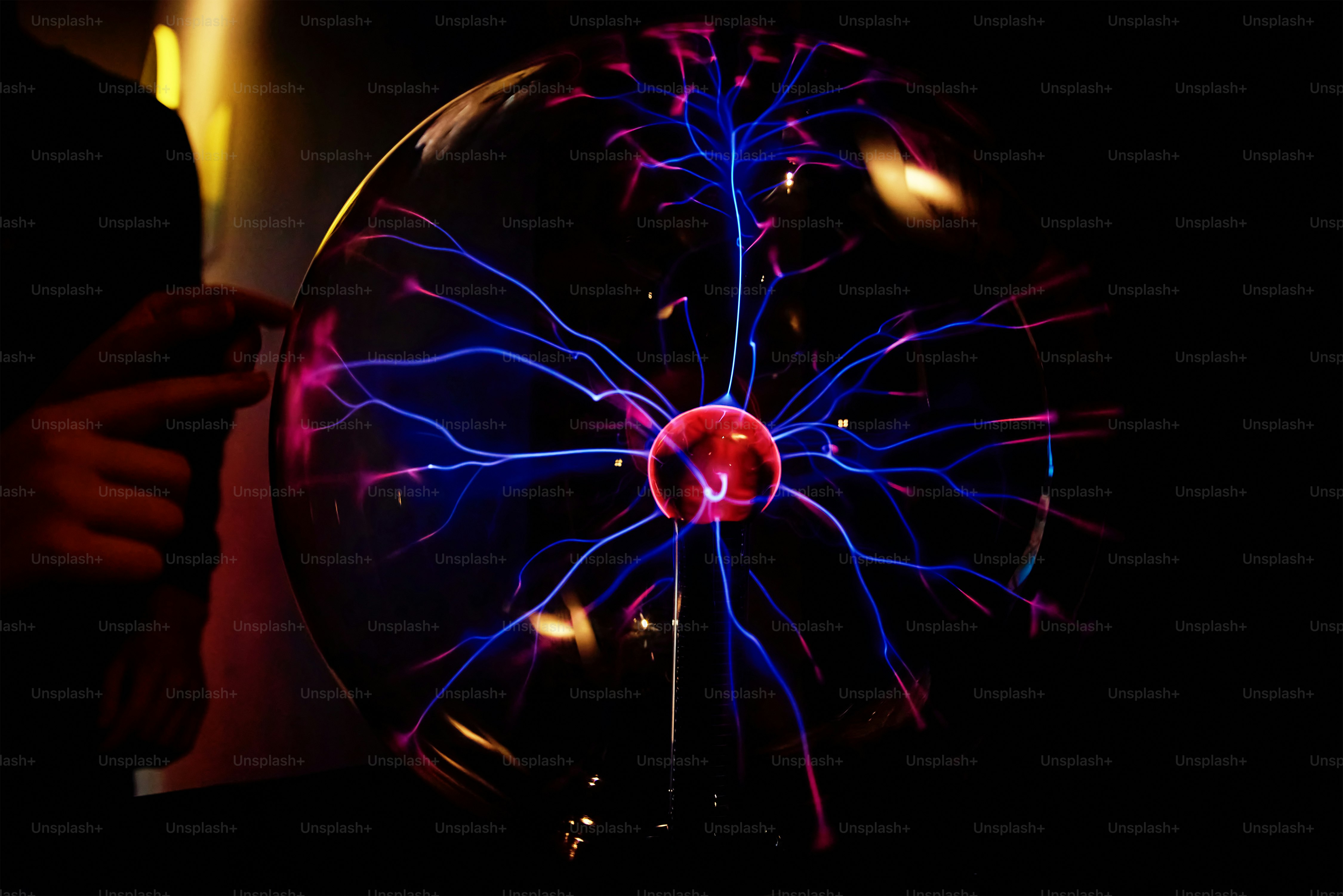 Plasma ball with energy rays on dark background, Physic model of plasma ...