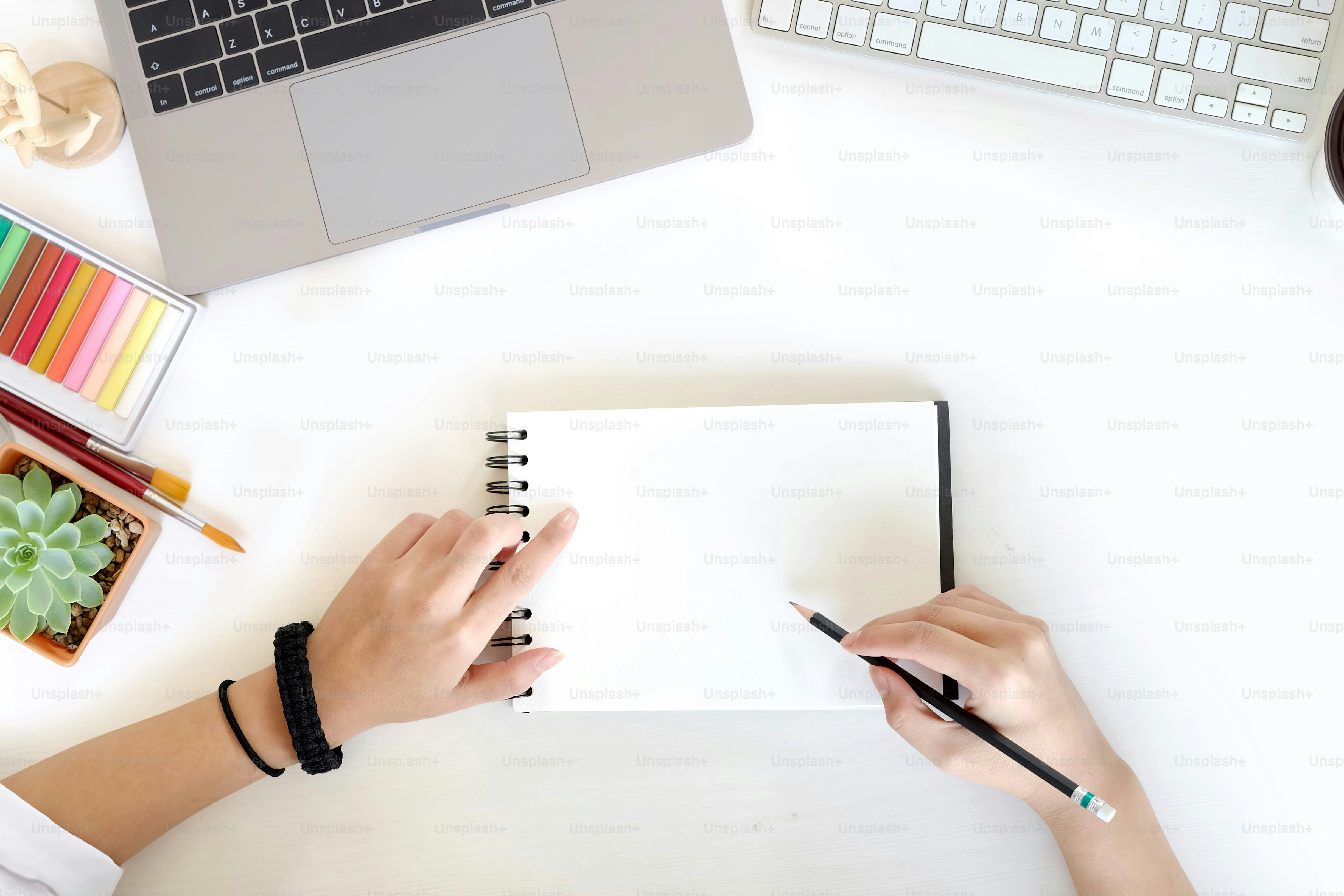 Designer working sketch drawing on desk workplace. photo – Table Image ...