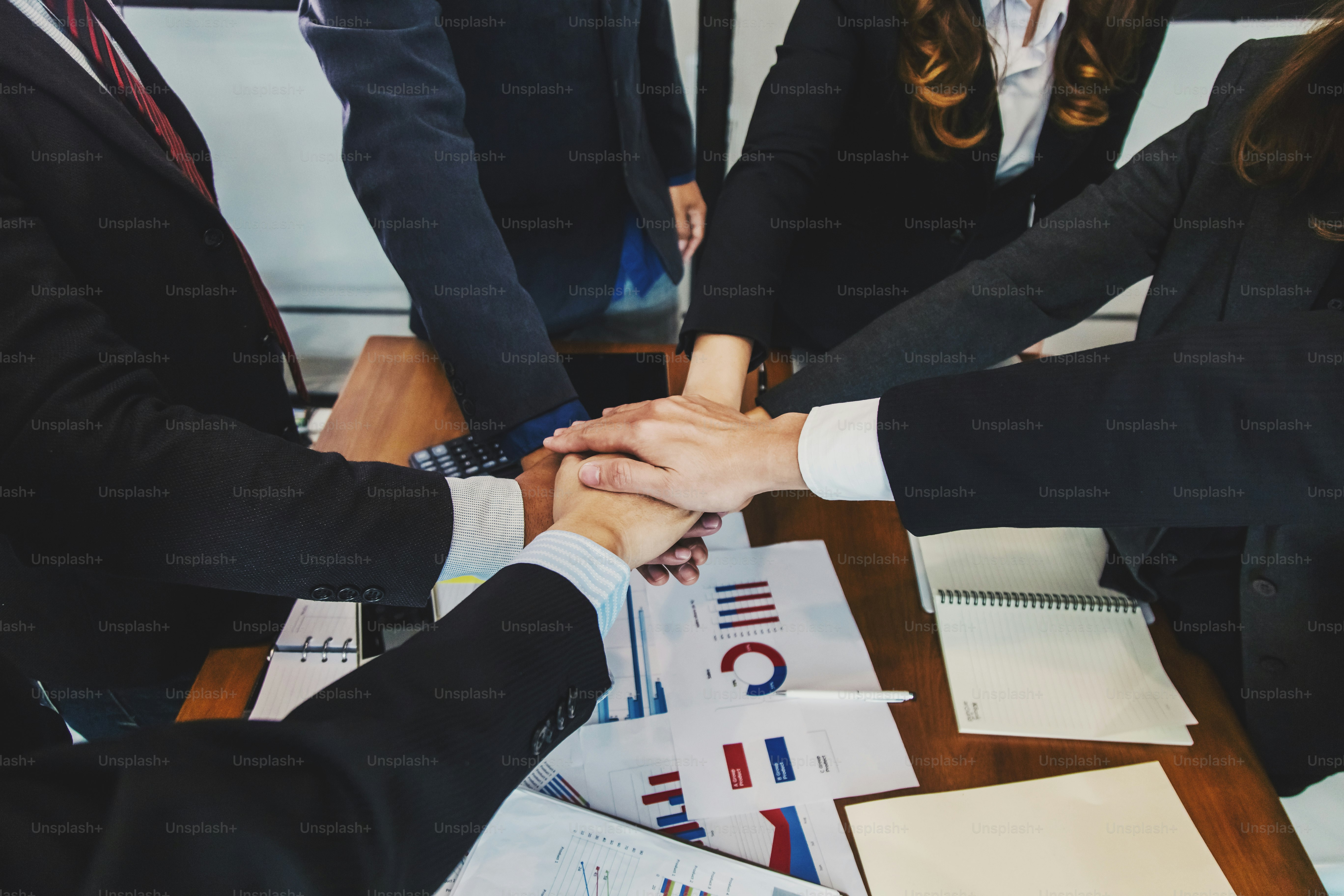 Teamwork of business people in the meeting. photo – Ethic Image on Unsplash