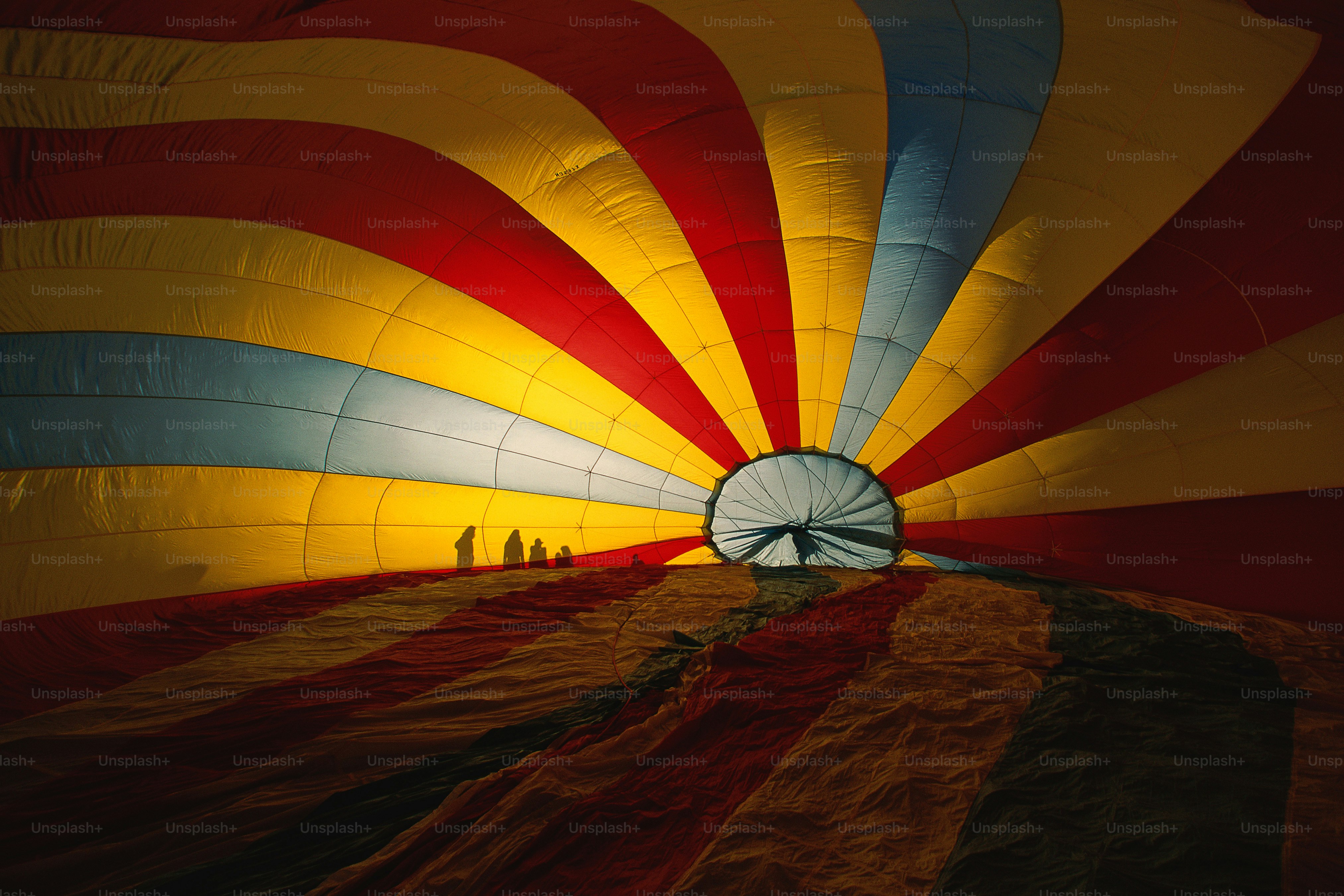 The inside of a hot air balloon with people inside photo – Hot air ...