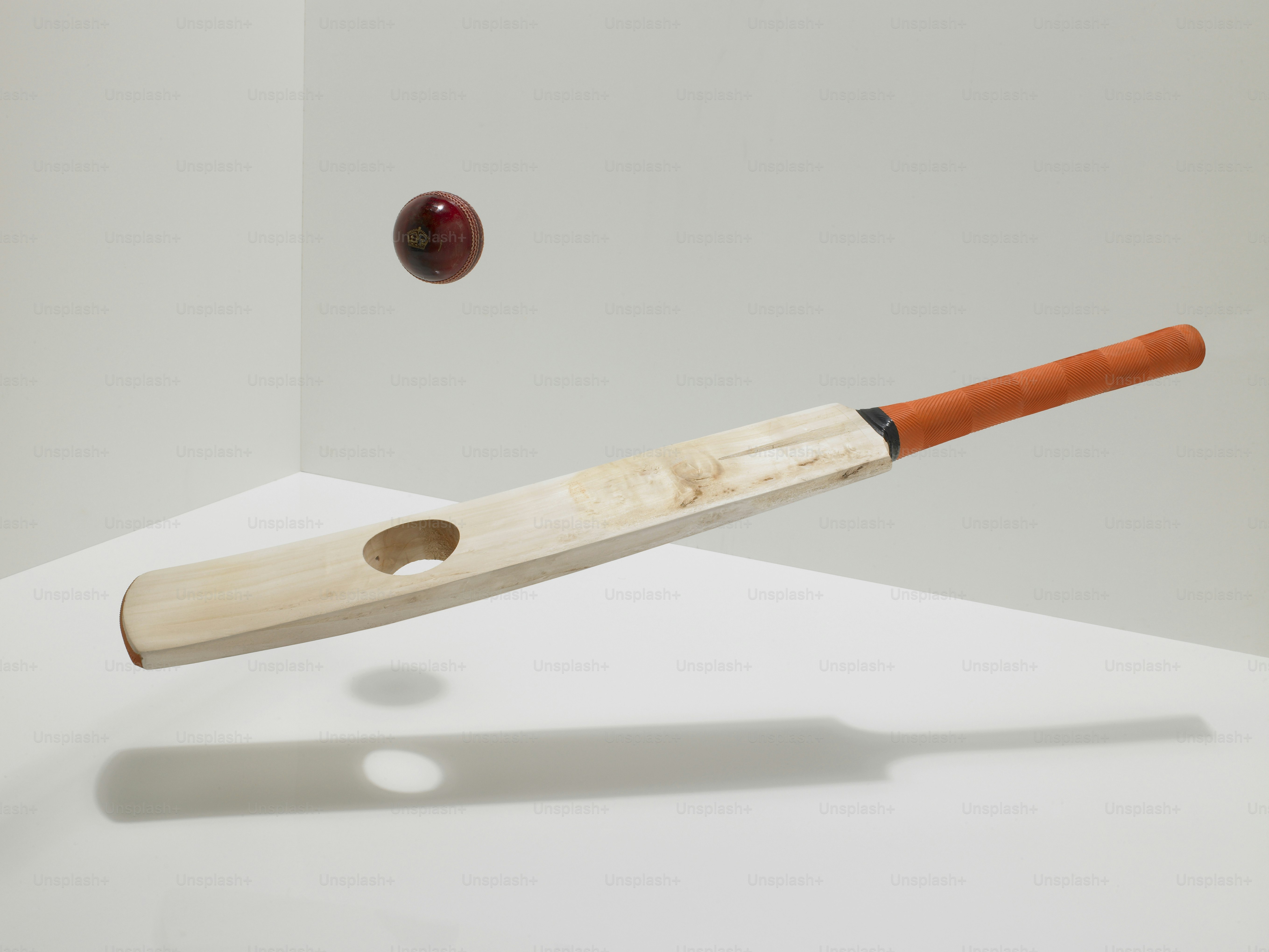 A baseball bat hitting a ball with a wooden bat photo – Cricket player ...