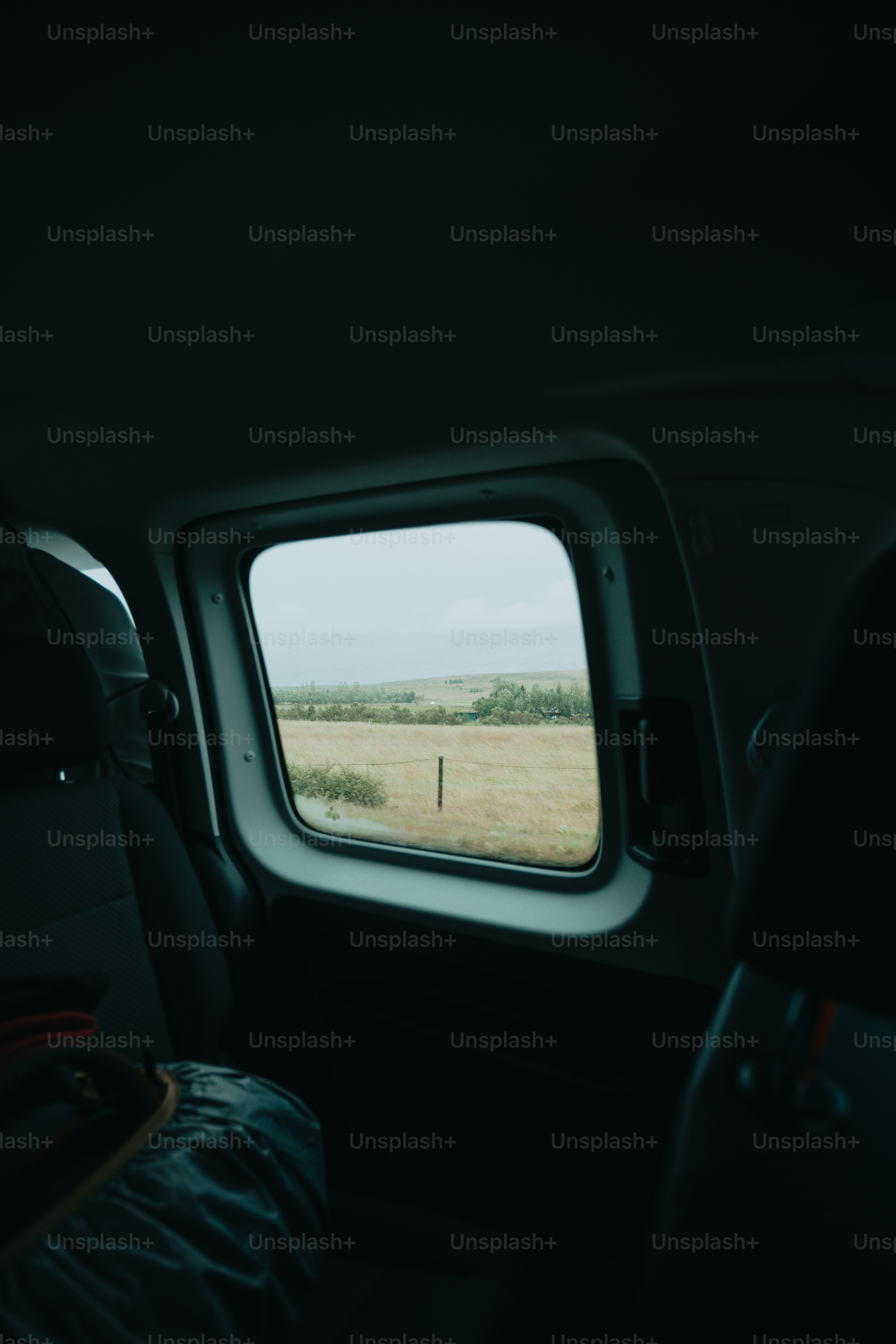 A view of a field through a window of a plane photo – Adventure Image ...