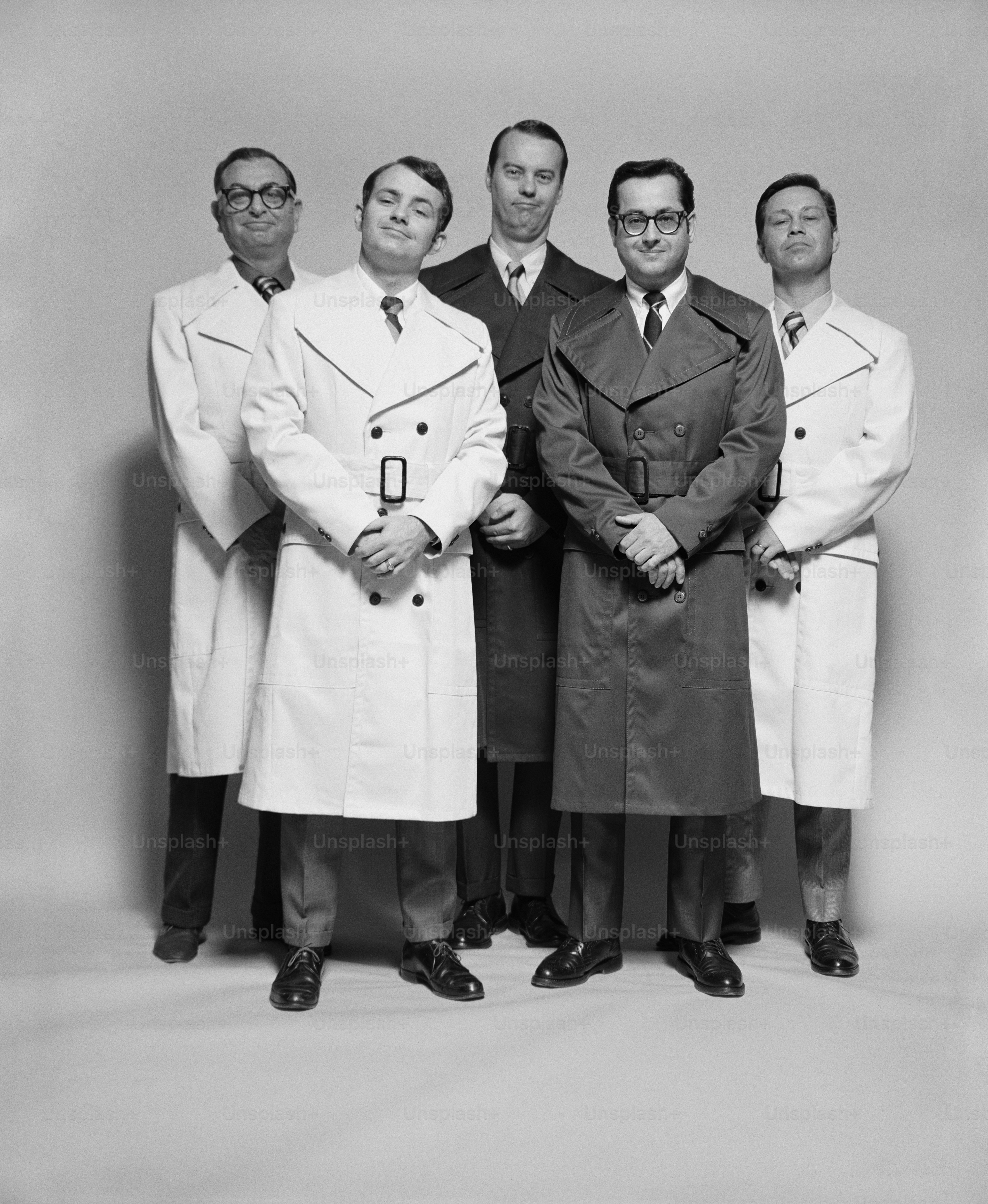 A group of men standing next to each other photo – Photography Image on ...
