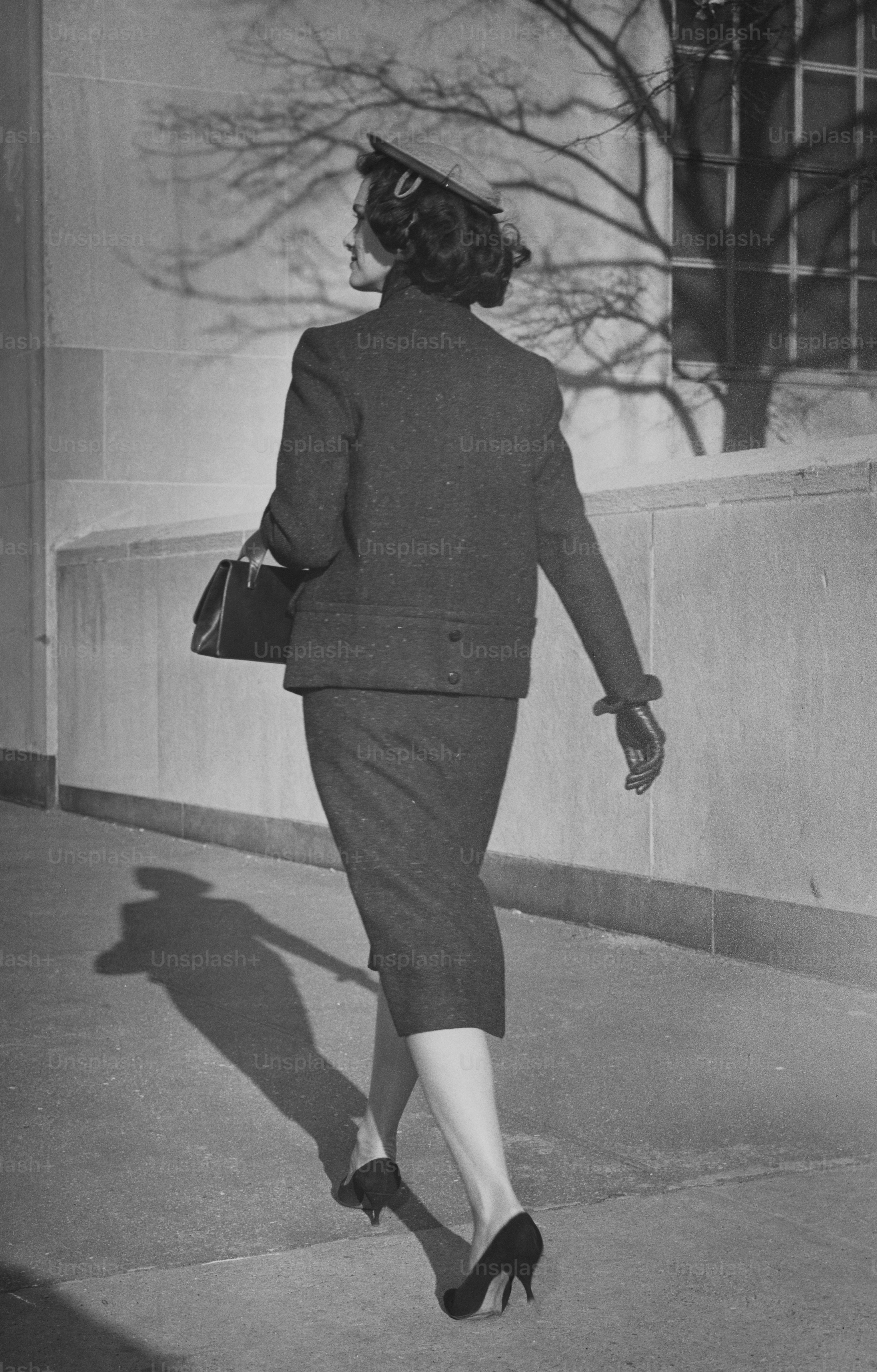 Businesswoman Walking Down The Street. (Photo by George Marks/Retrofile ...