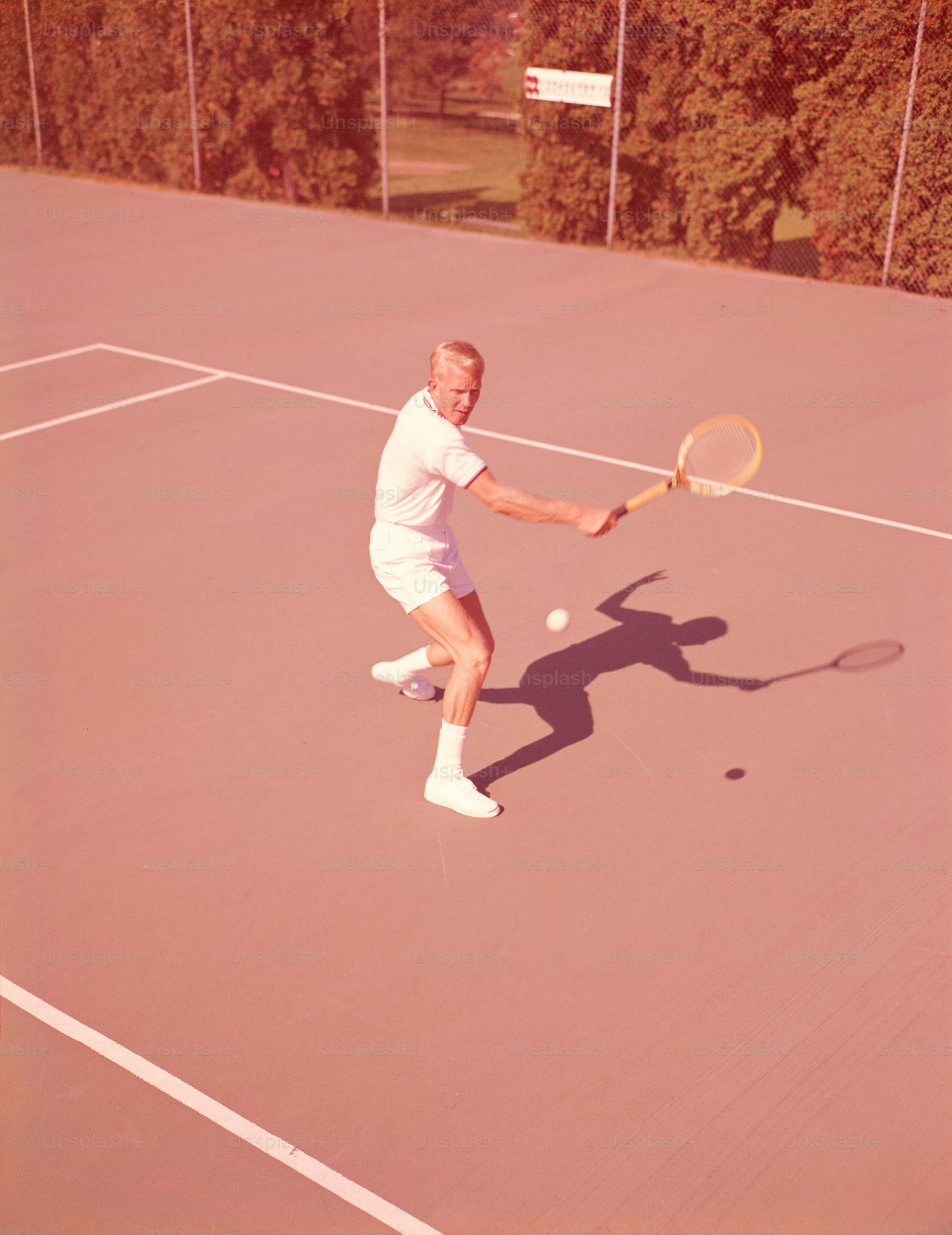UNITED STATES - CIRCA 1950s: Man playing tennis. photo – Tennis racket ...