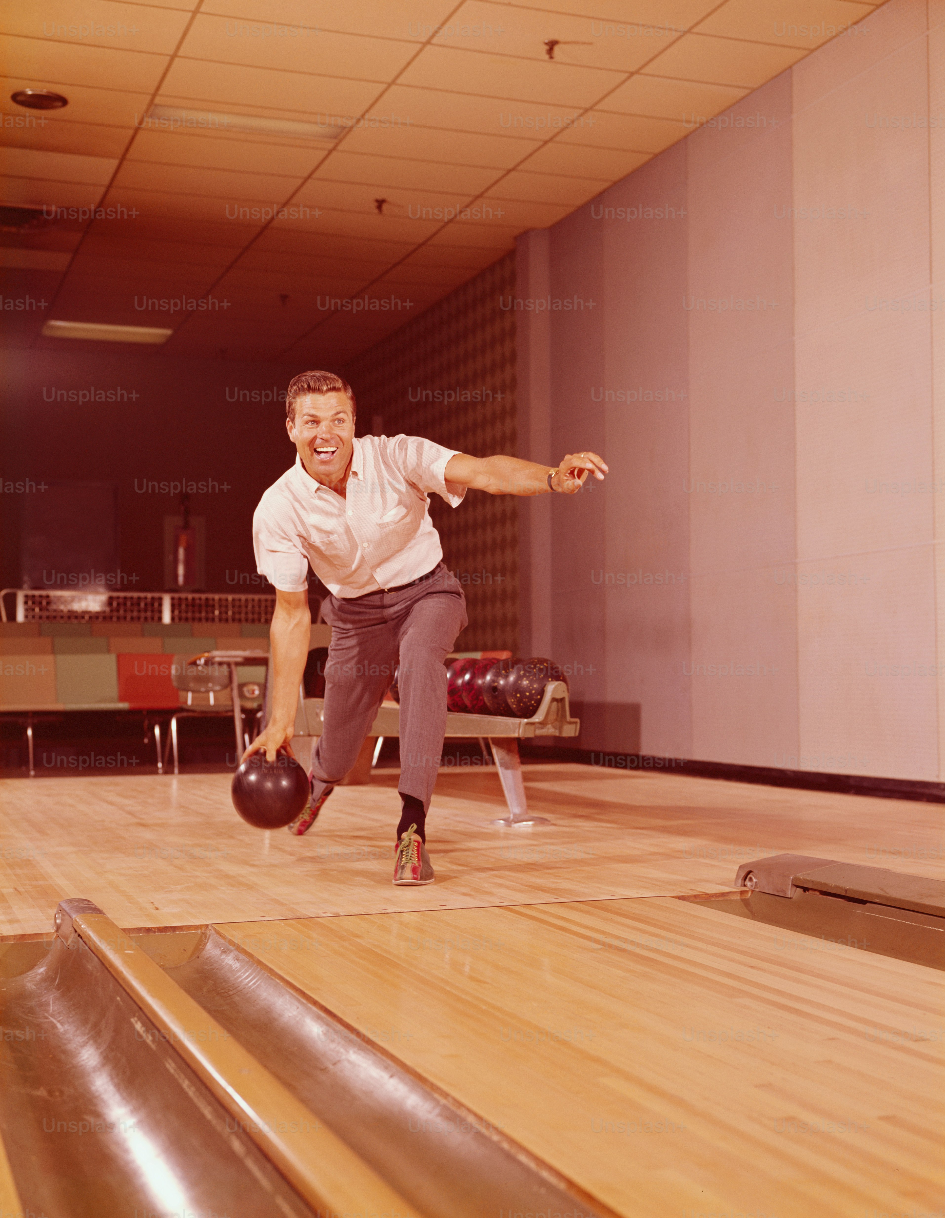 UNITED STATES - CIRCA 1960s: Man bowling. photo – One person Image on ...