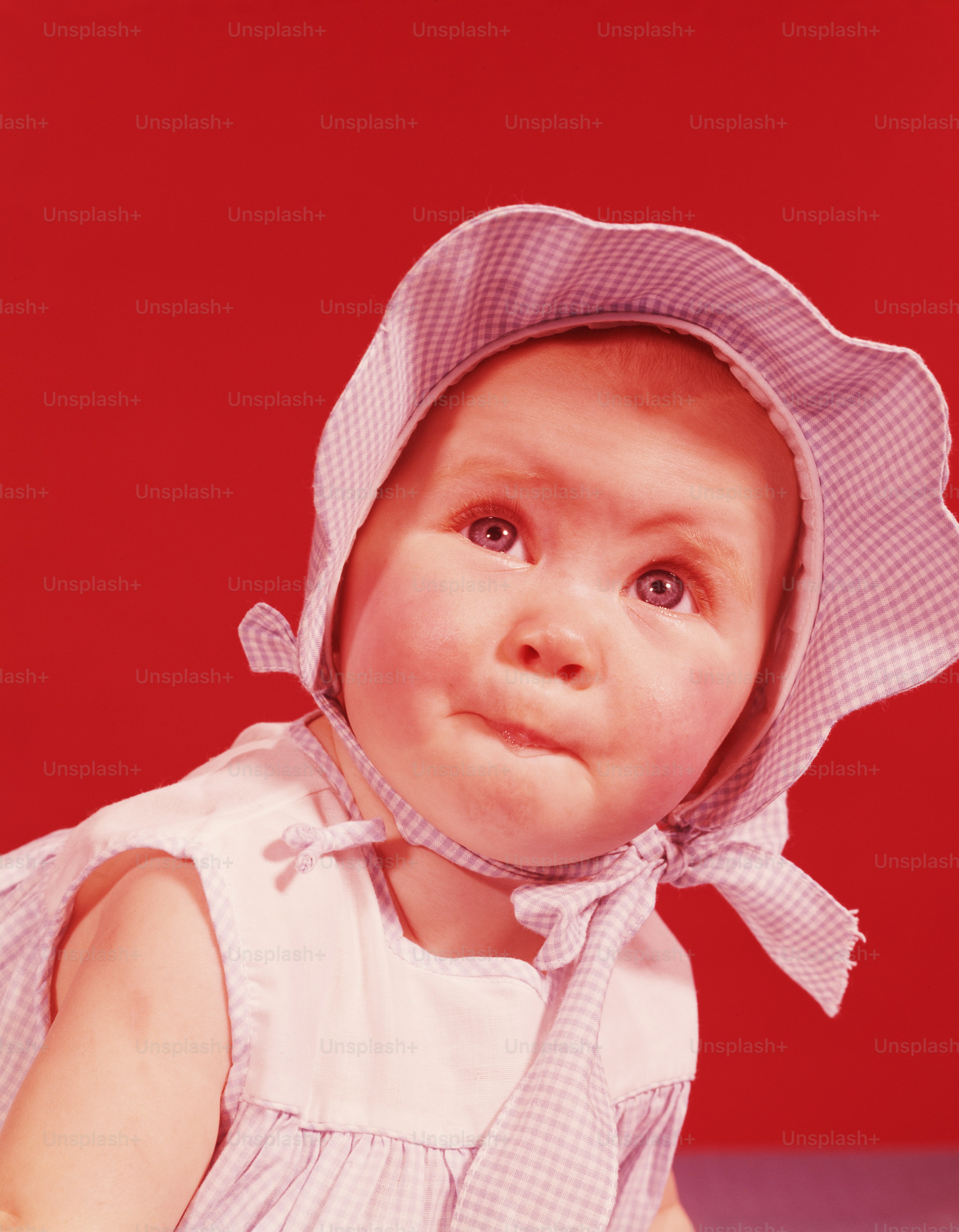 UNITED STATES - CIRCA 1950s: Baby girl wearing bonnet and sundress ...