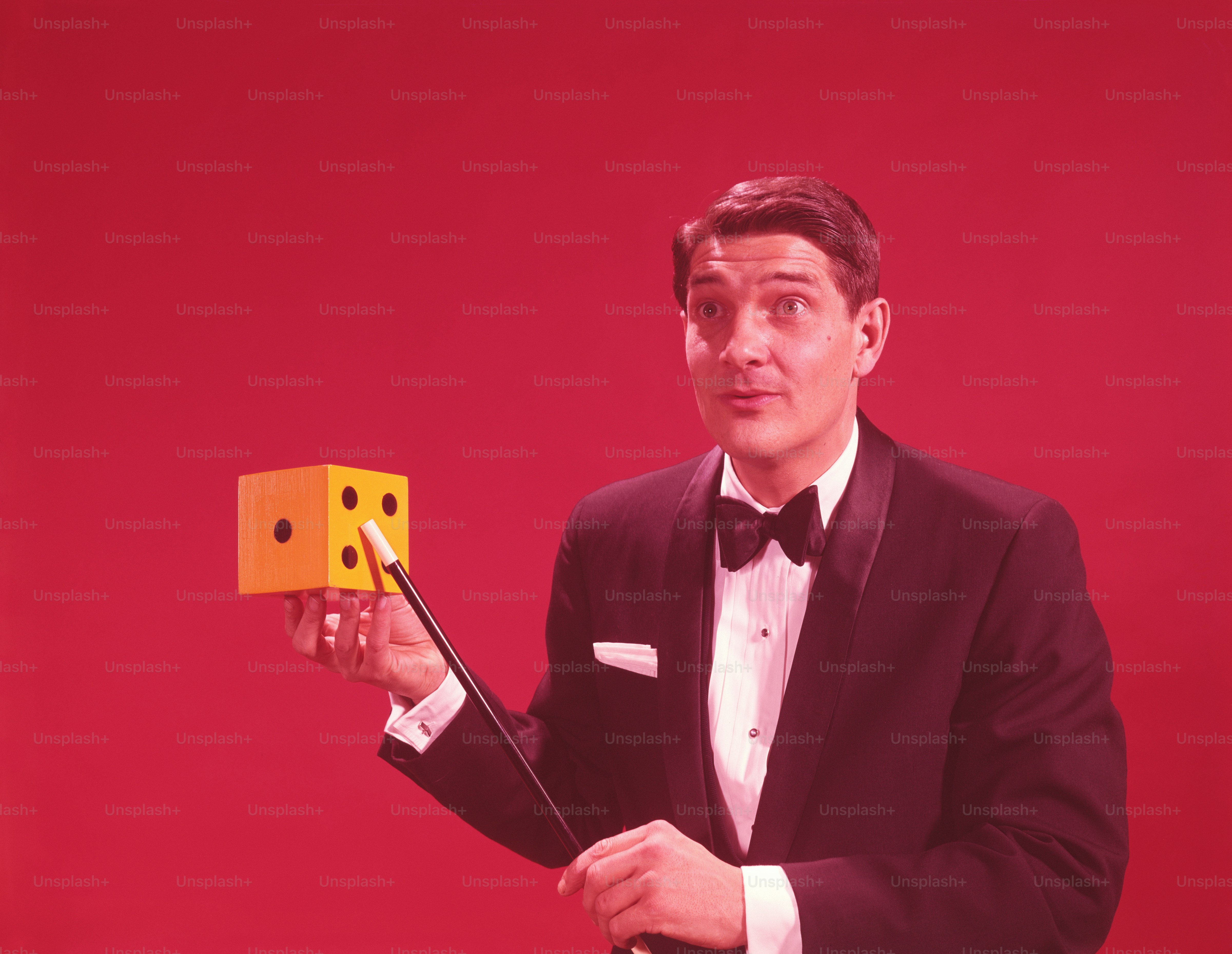 UNITED STATES - CIRCA 1970s: Male magician performing magic trick ...