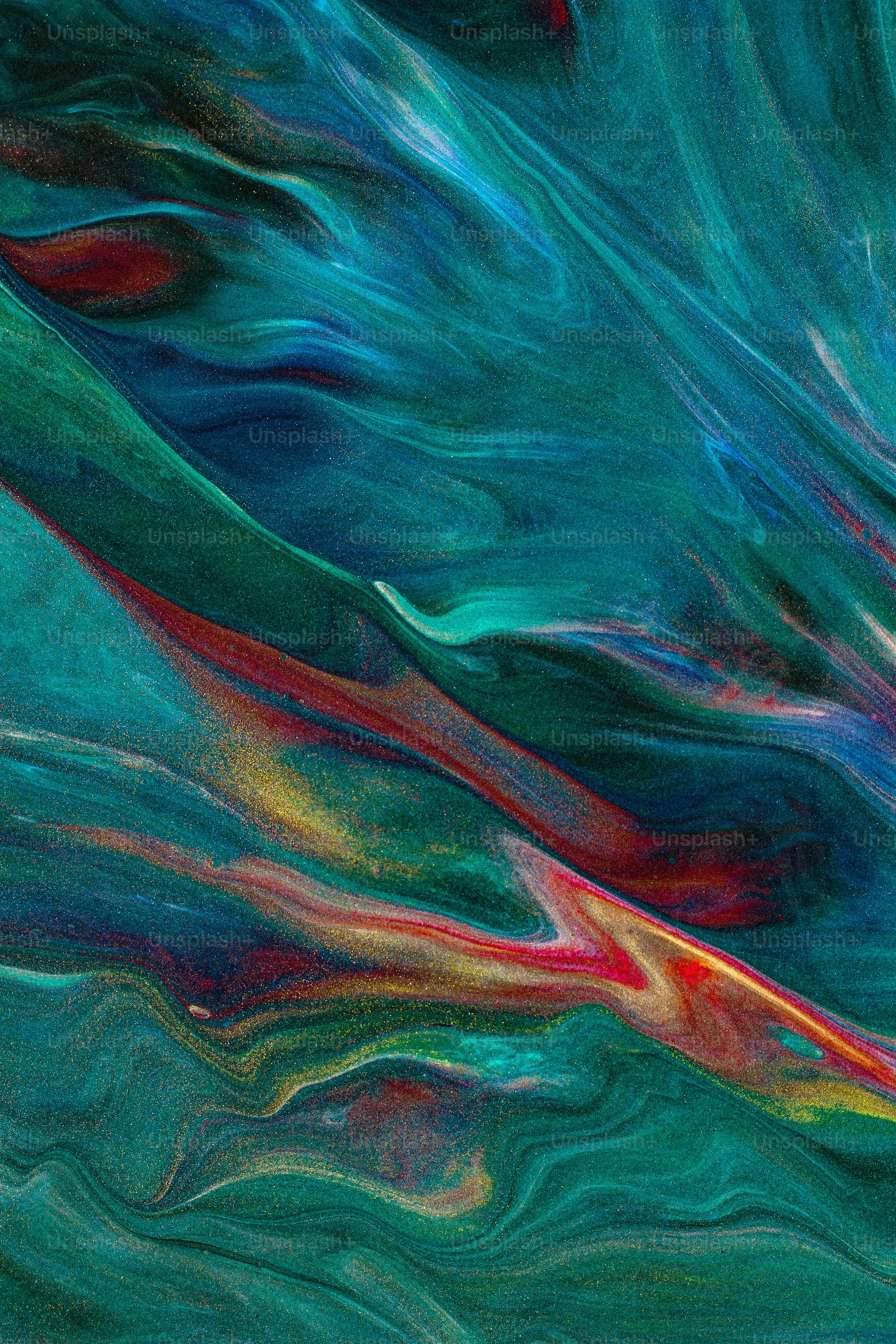 An abstract painting of blue, red, and green colors photo – Liquid ...
