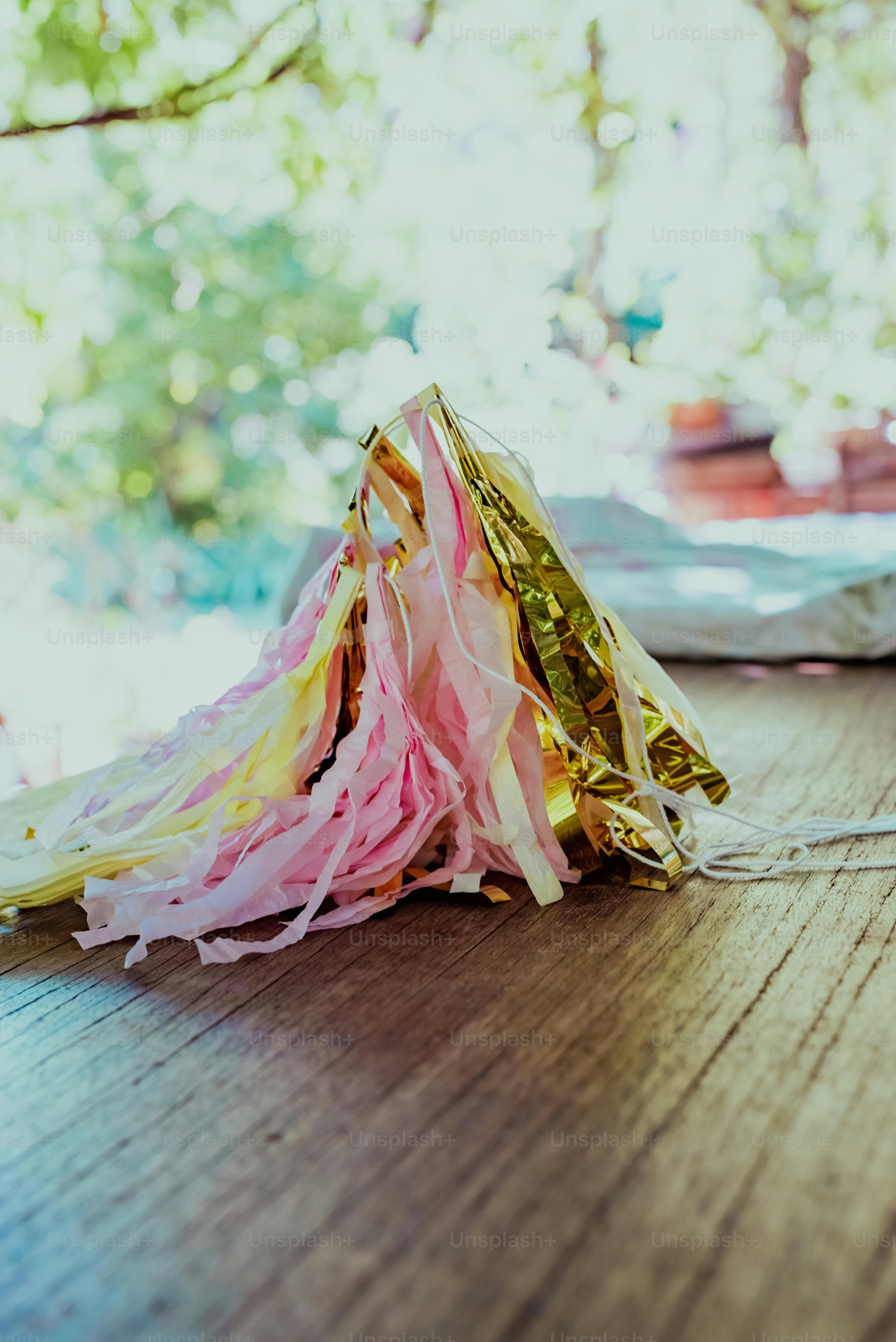 A table with a vase of flowers on top of it photo – Spring Image on ...