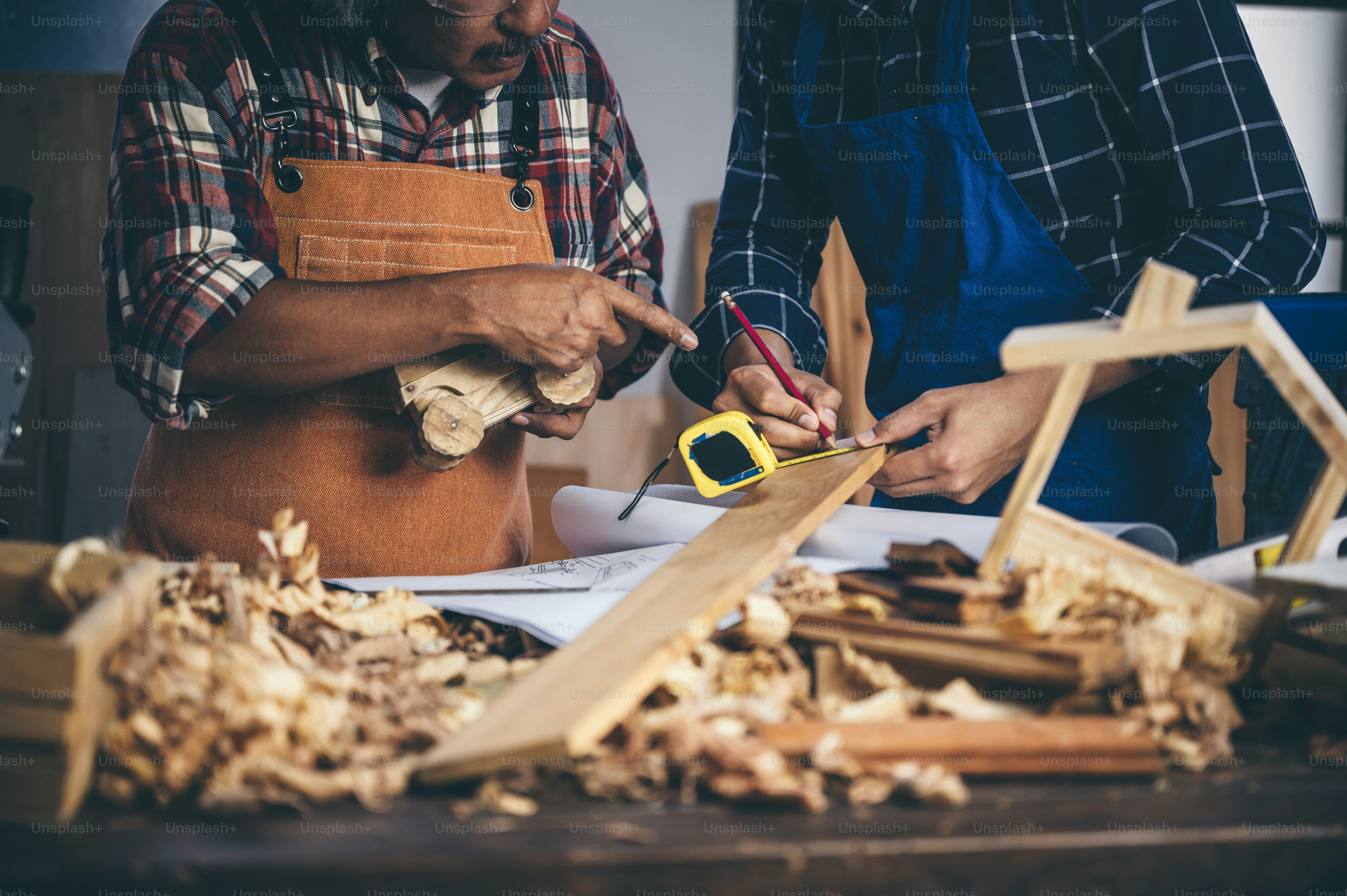 Background image of woodworking workshop: carpenters work table with ...
