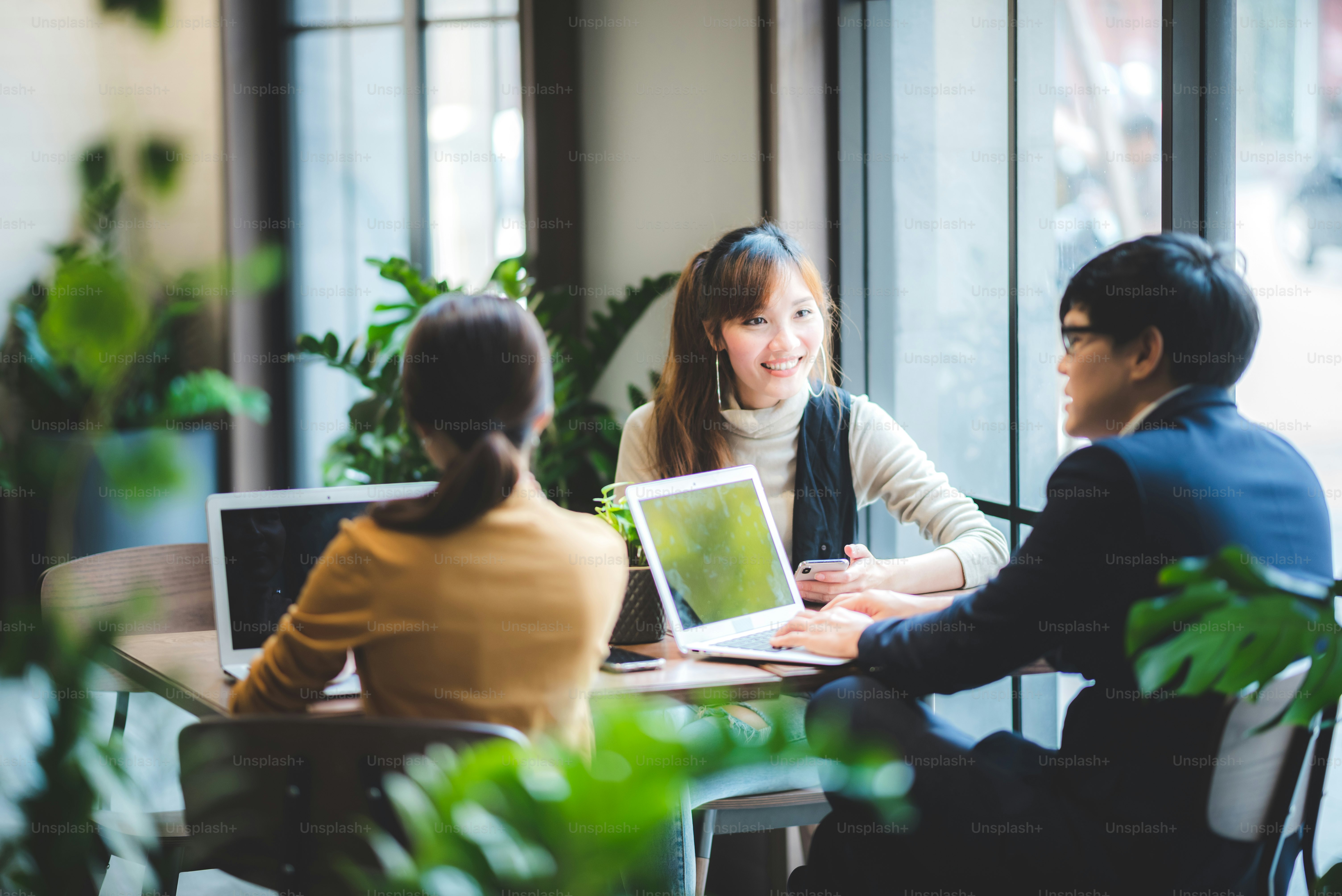 Successful business group of people at work in co-working space office ...