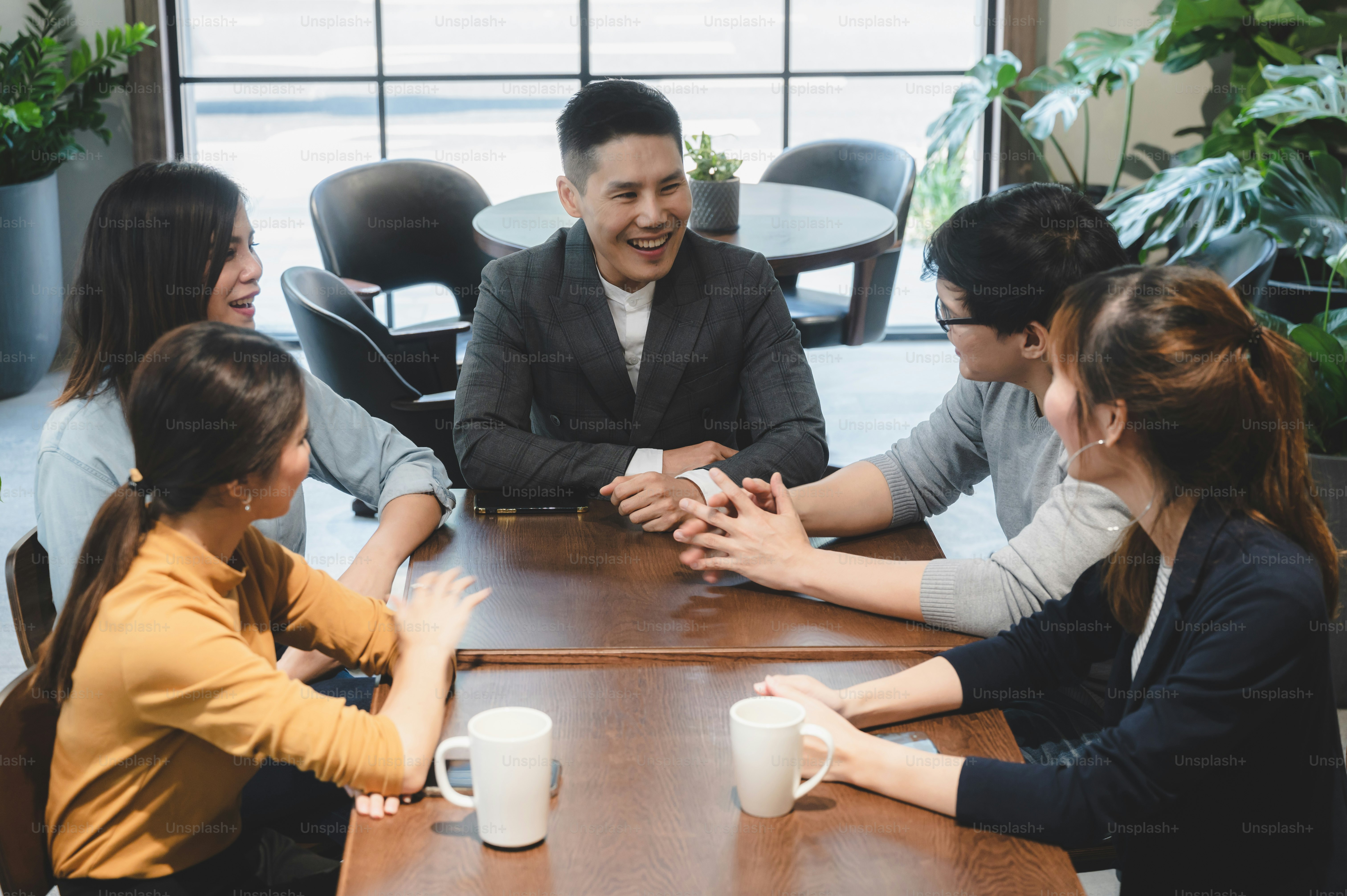 Professional business person team colleague meeting and discussion ...