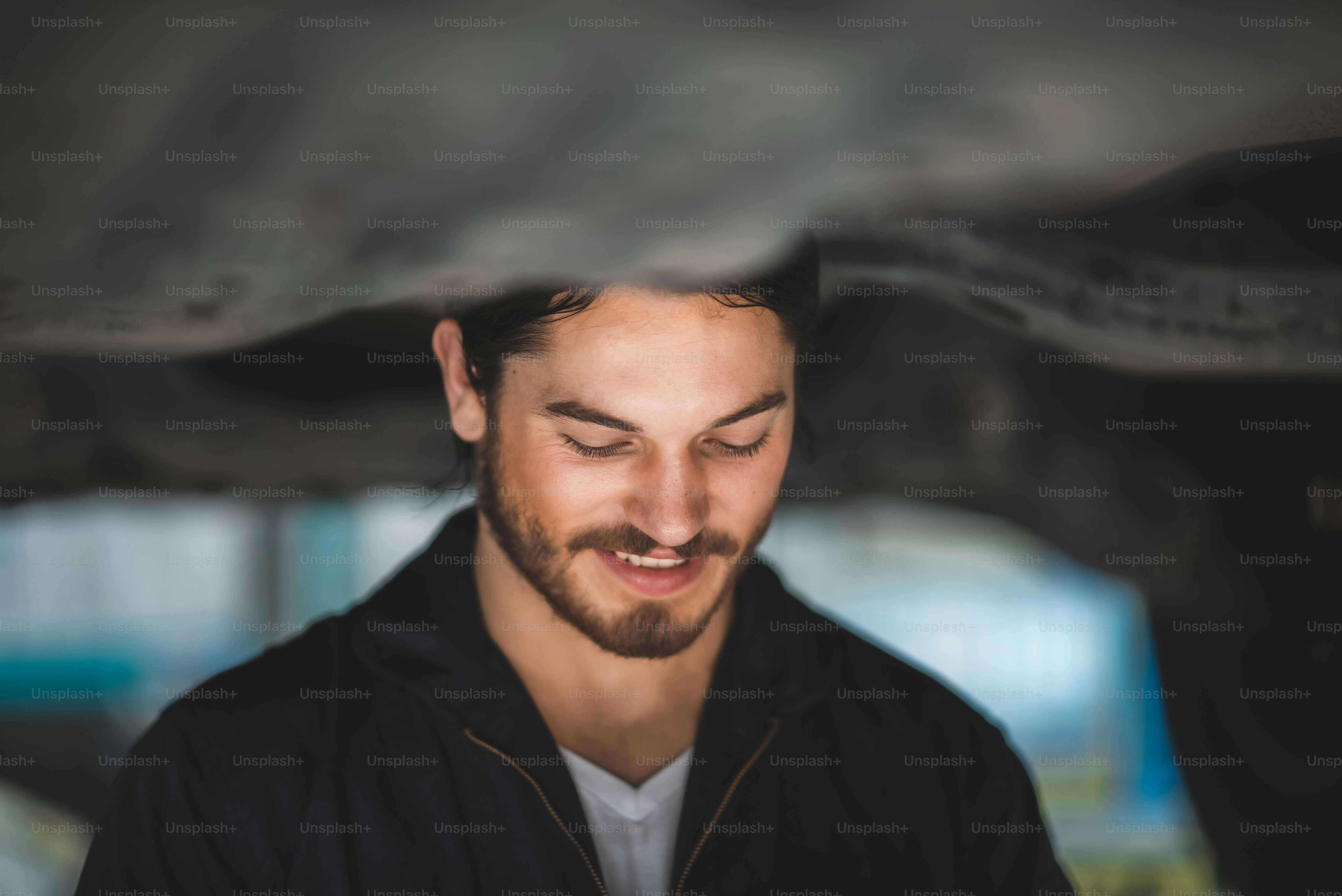 A portrait of machanic while maintennance a car, women and men are co ...