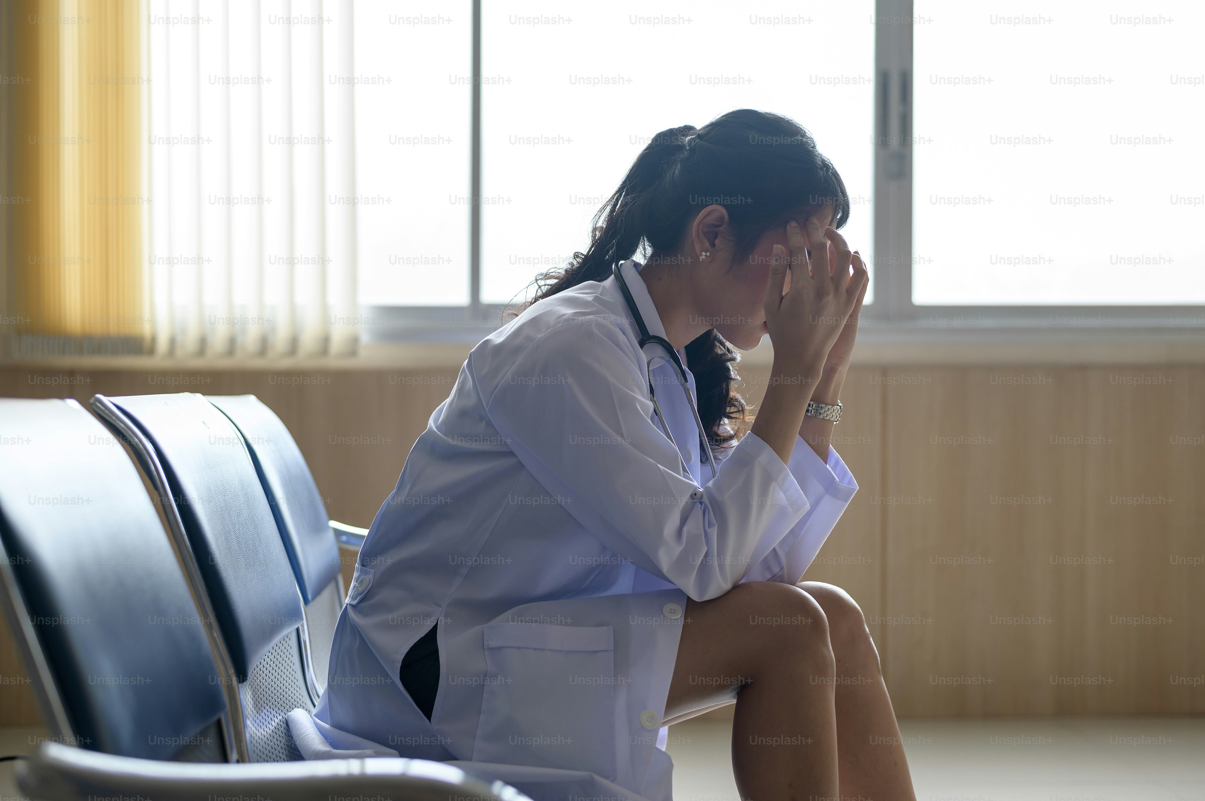 A doctor is sad in hospital photo – Regret Image on Unsplash