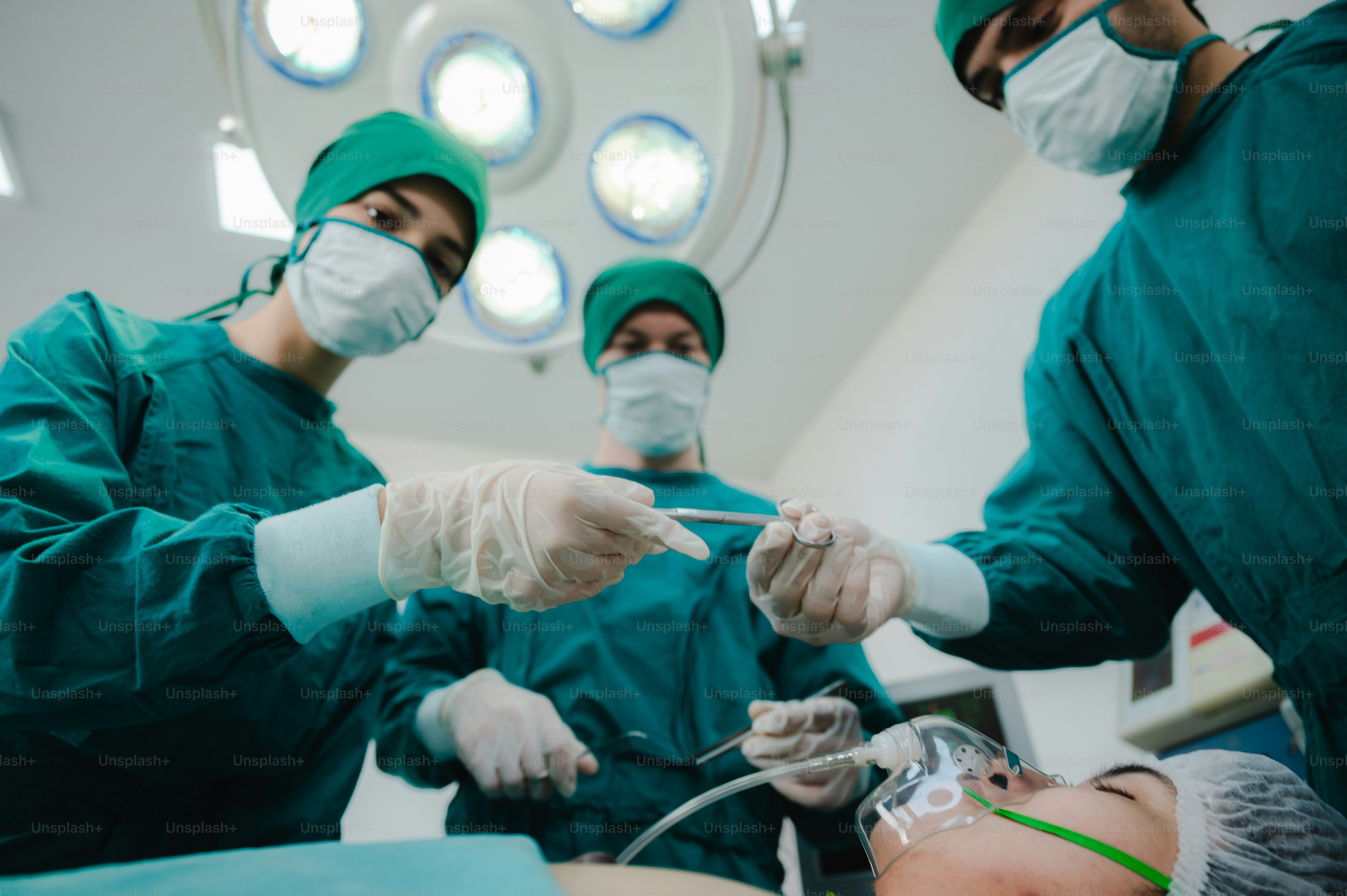 Professional surgeon doctor teamwork person working in hospital ...