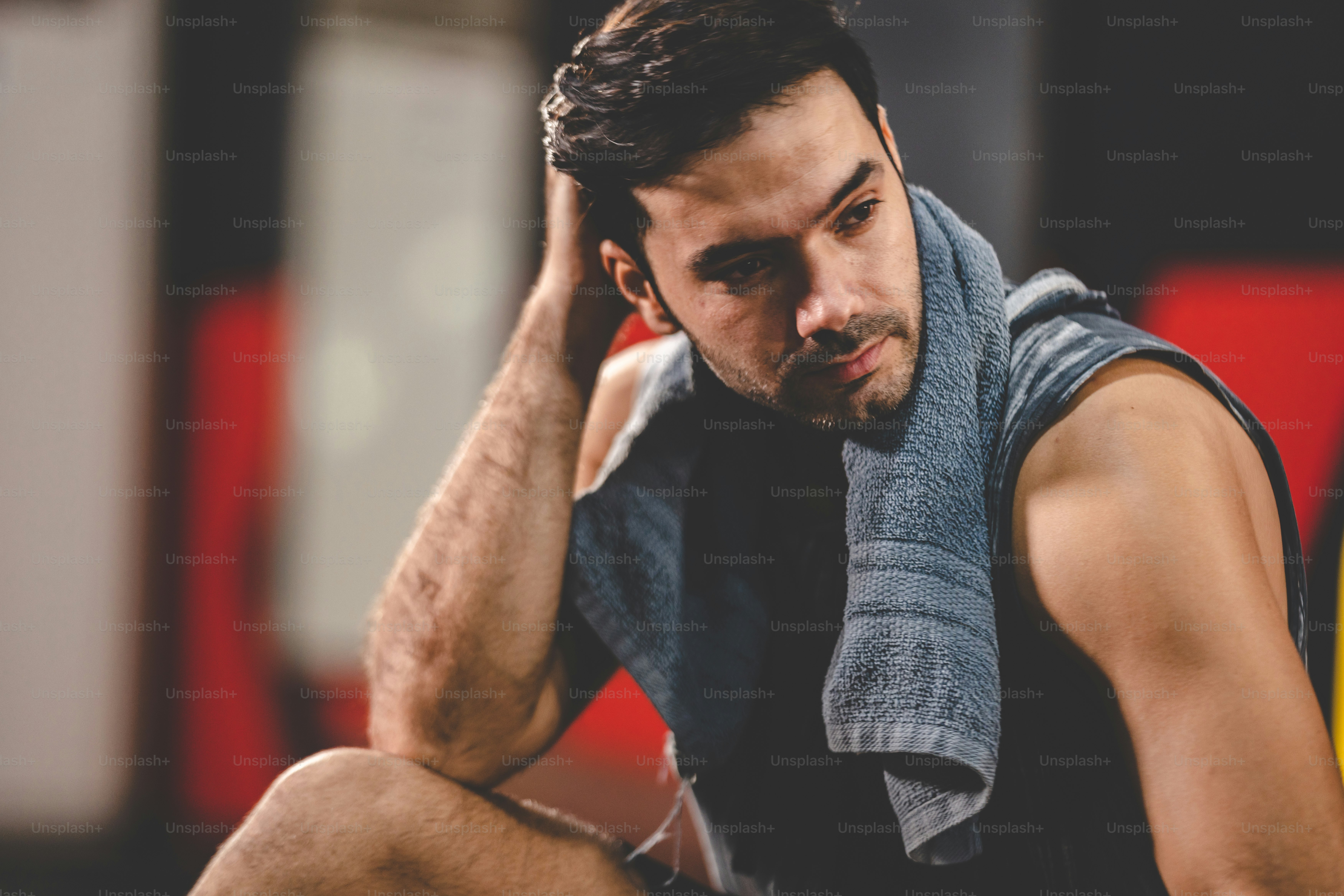 Strong athlete man person exercising in modern sport gym, active ...