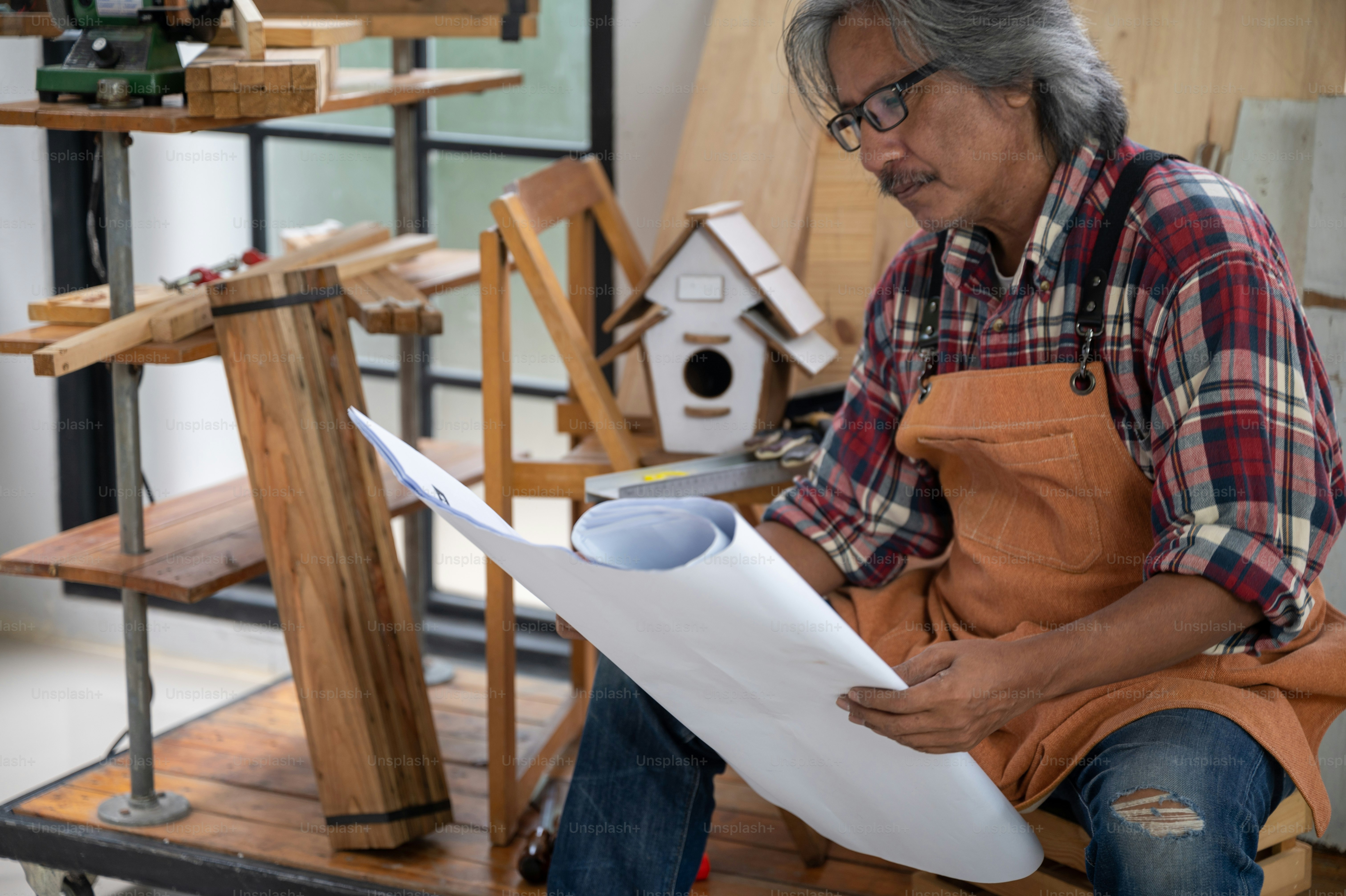Professional carpenter man working with woodwork industry tool ...