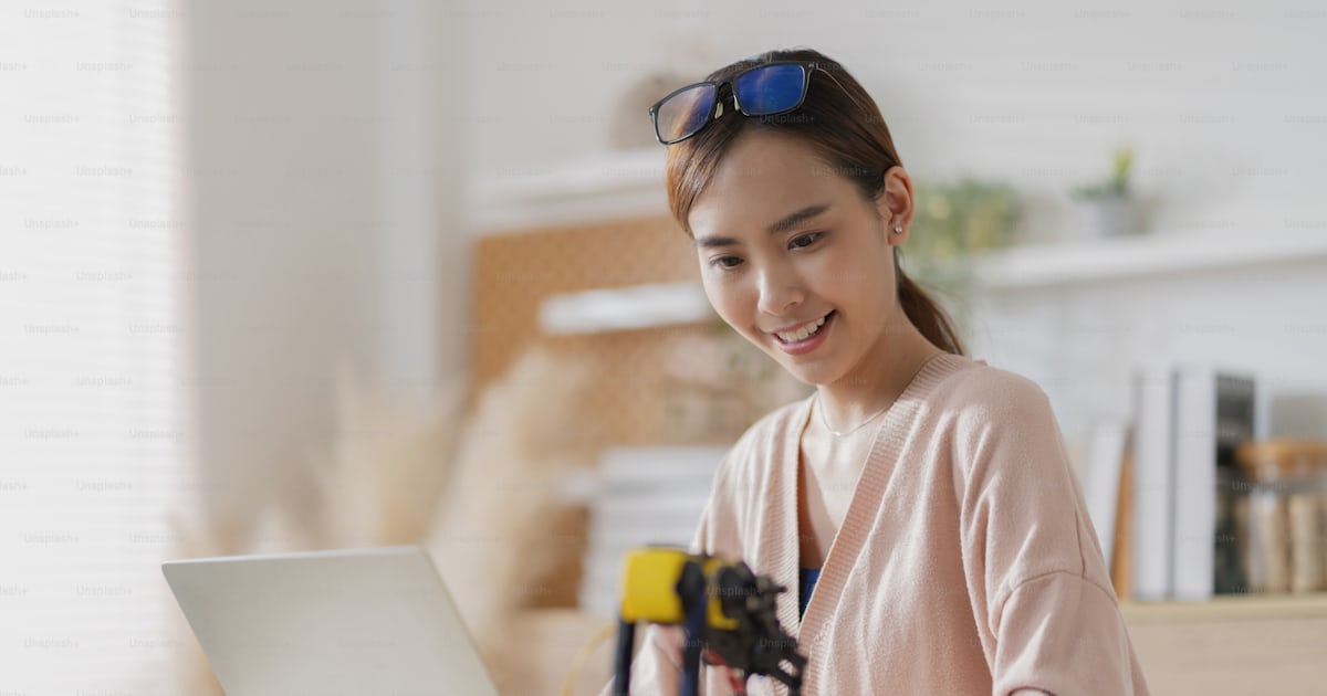 Smart Asian Female Programer Learning Robot Arm Ai Coding Electronic Board Cable In Stem Steam