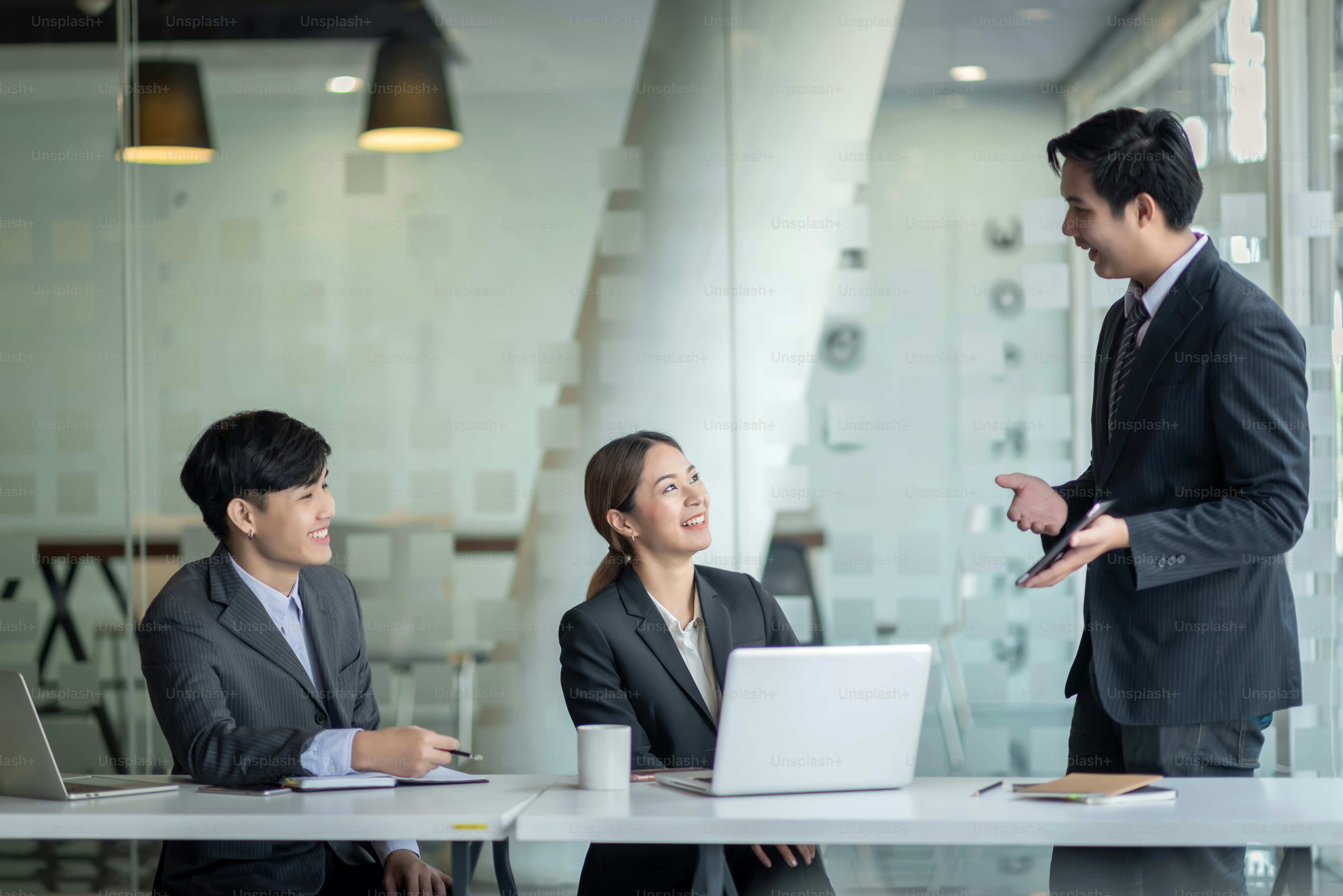 Young asian business group with the creative work, talk and exchange ideas shared at the meeting ...