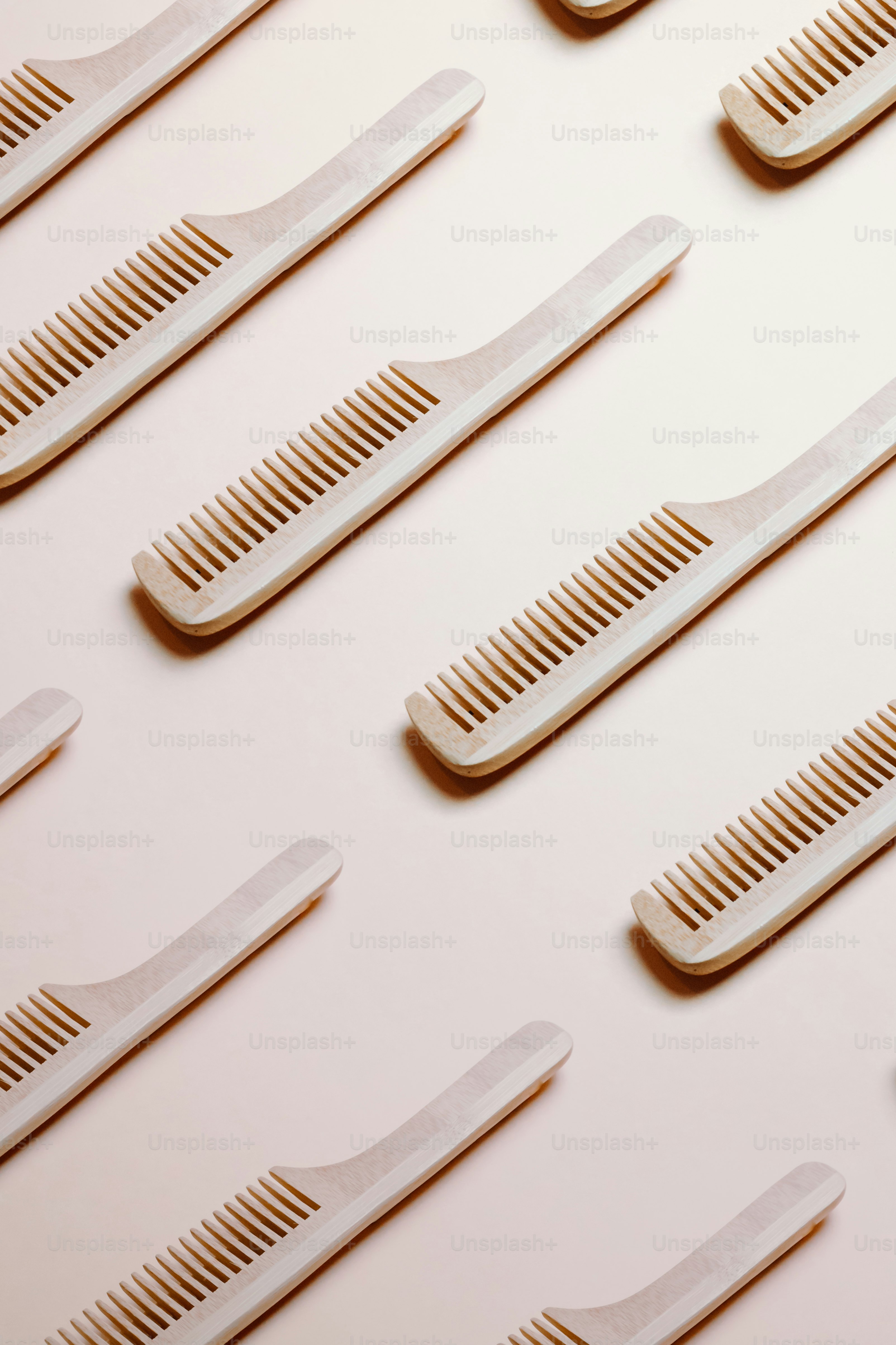 A group of combs sitting on top of each other photo – Comb Image on ...