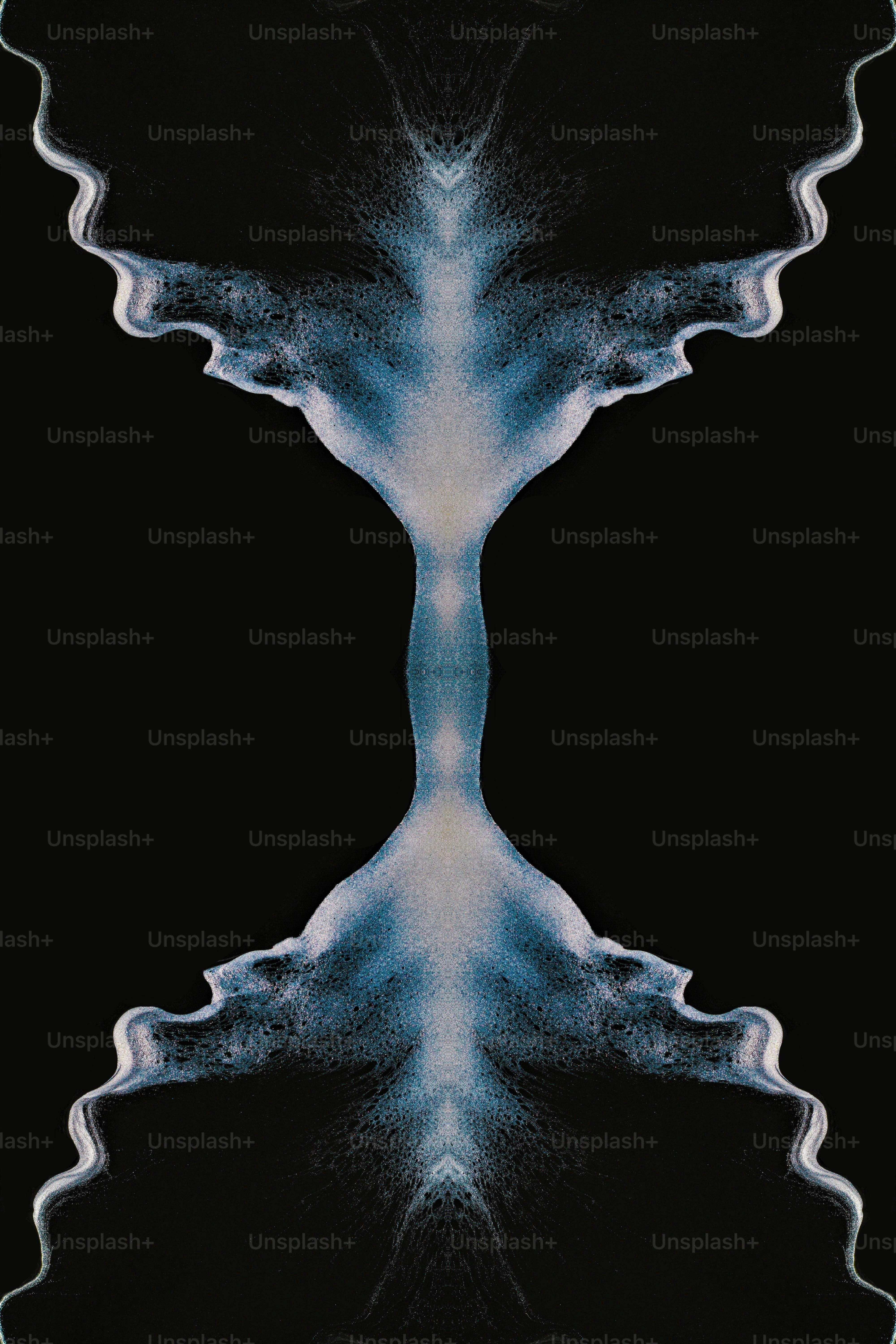 A group of jelly like objects floating in water photo – Abstract Image ...