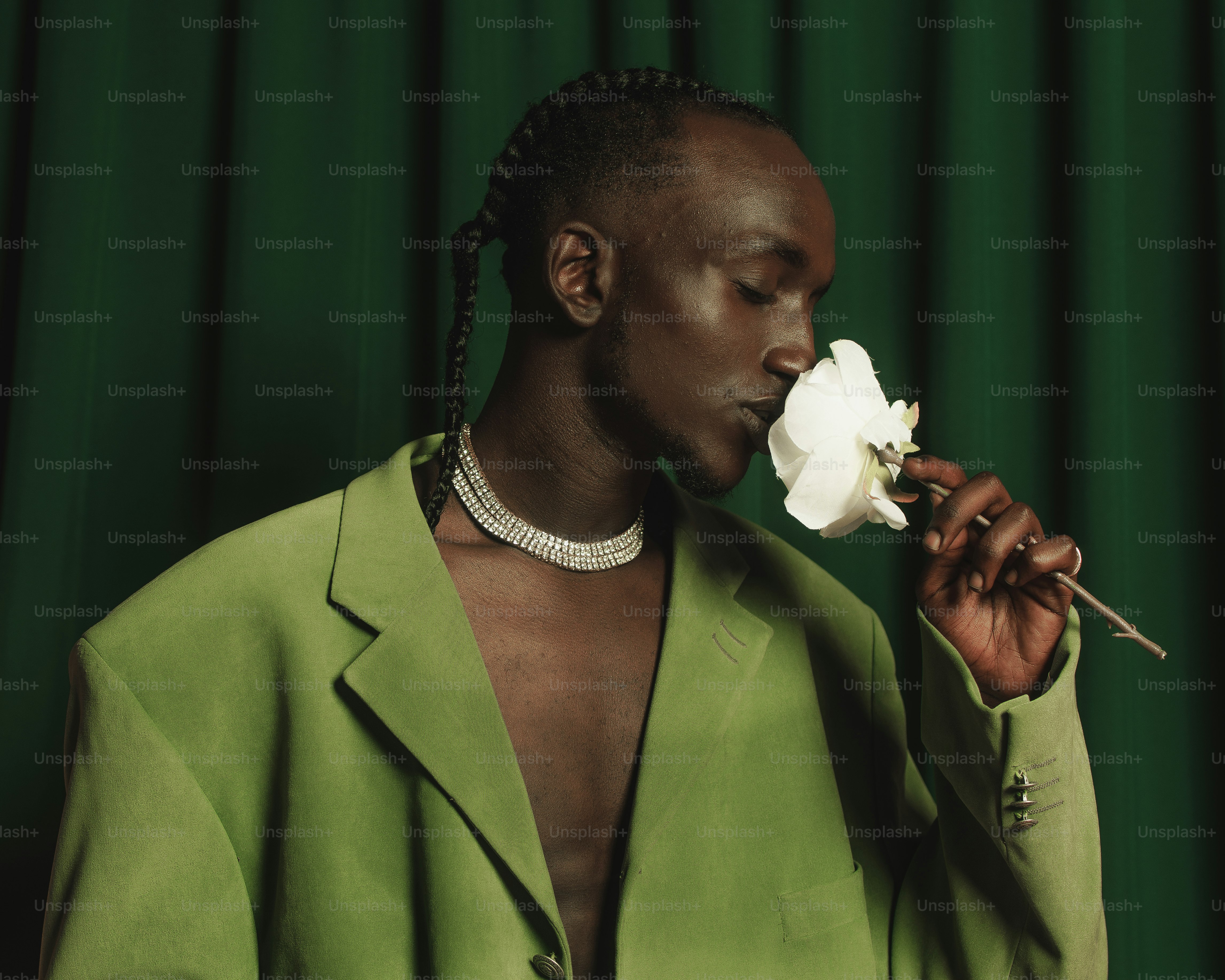 A man with a flower in his mouth photo – Fashion Image on Unsplash