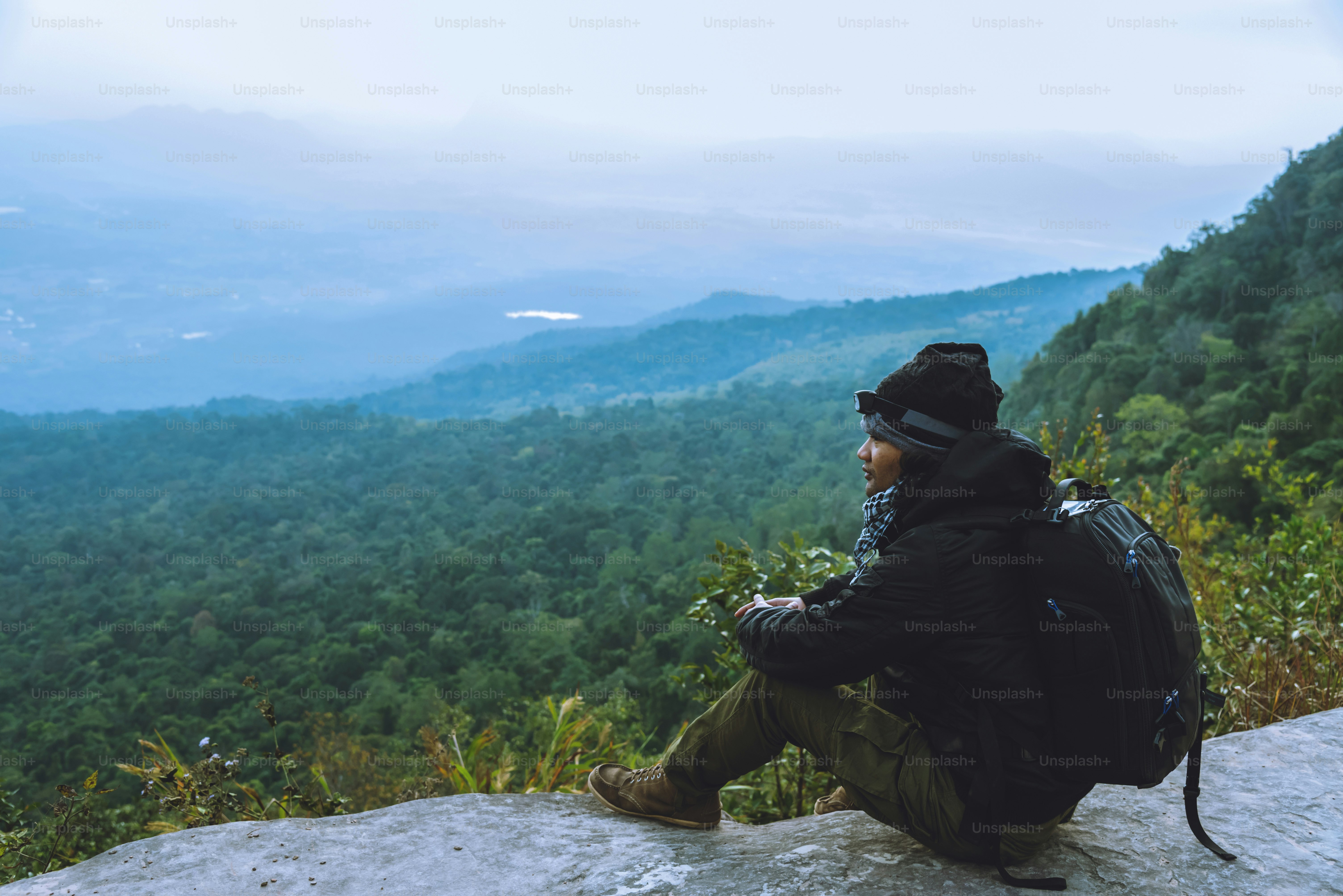 Men asians travel relax in the holiday. Admire the atmosphere landscape ...