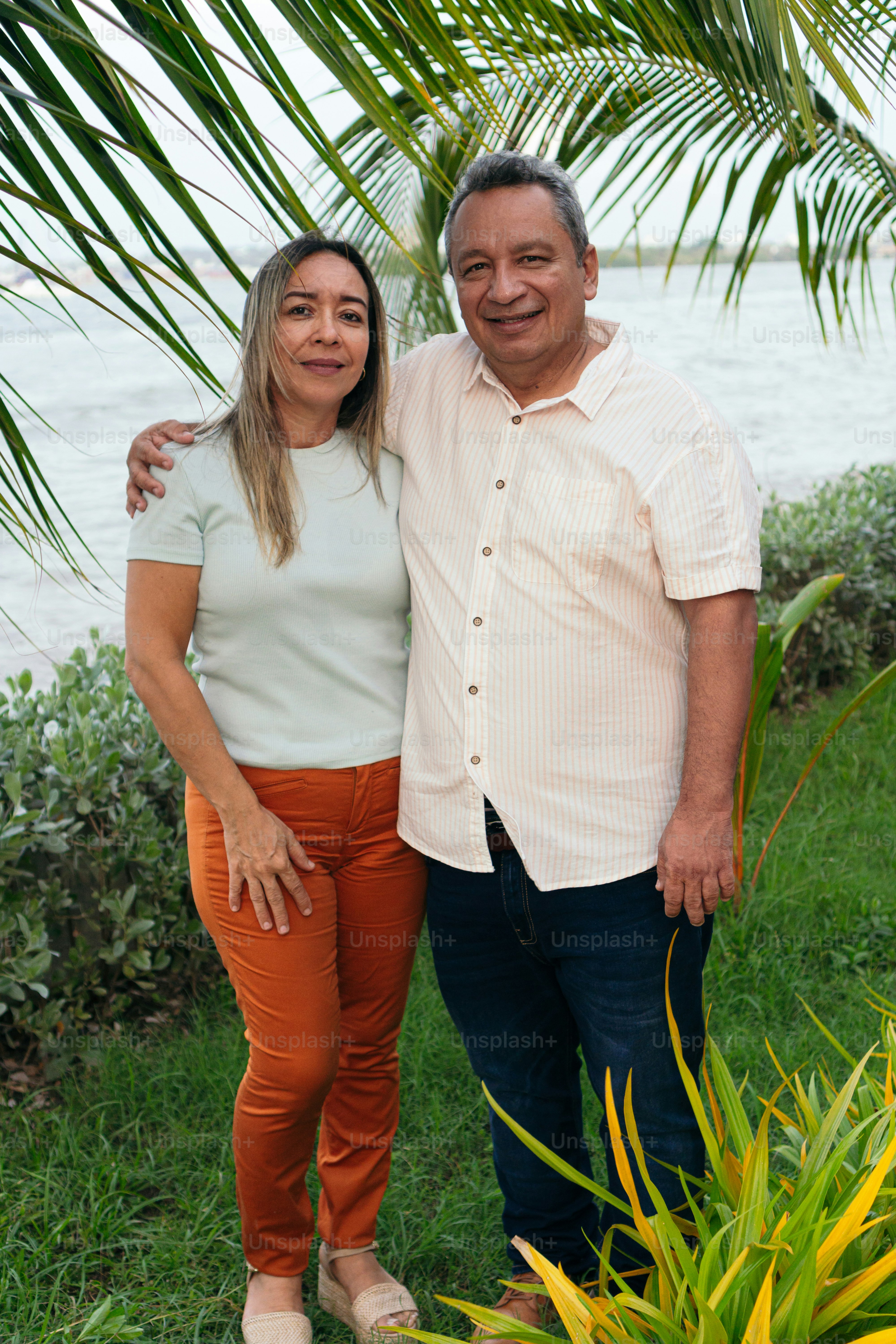 Portrait of a 50-year-old couple in a park photo – Husband and wife ...