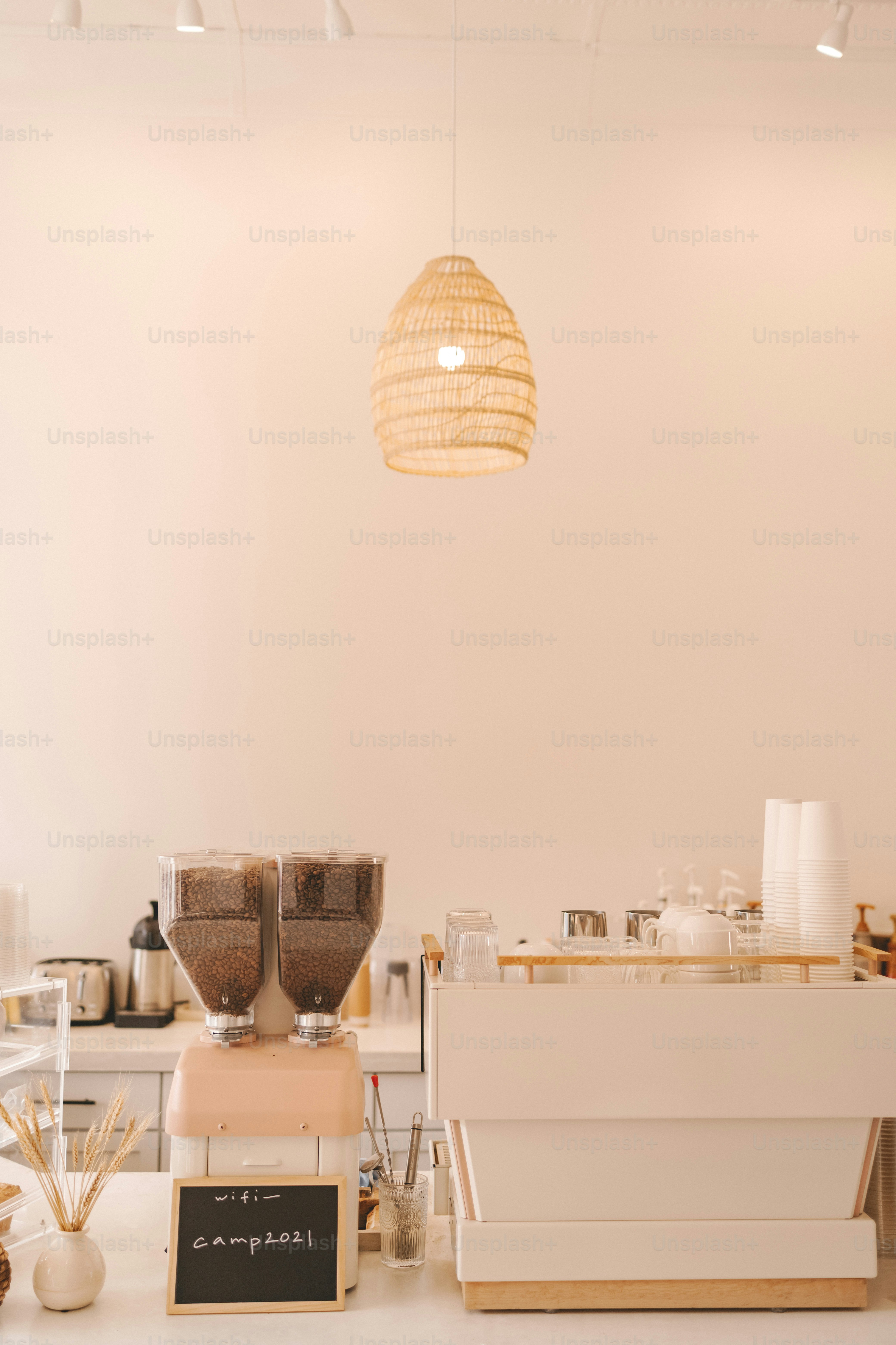 A coffee shop with a variety of items on the counter photo – Coffee ...