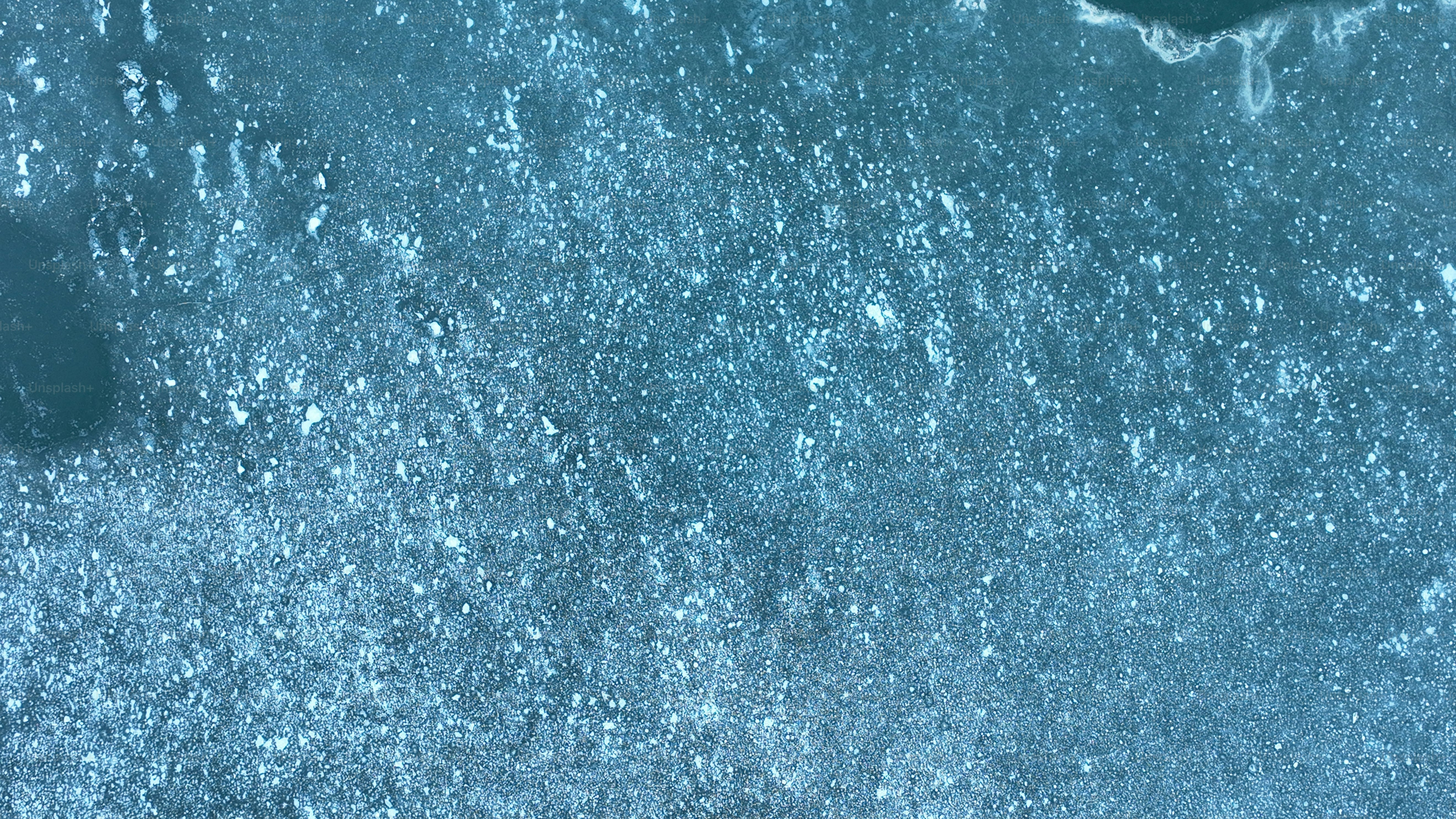 A close up of the water surface of a body of water photo – Ice texture ...