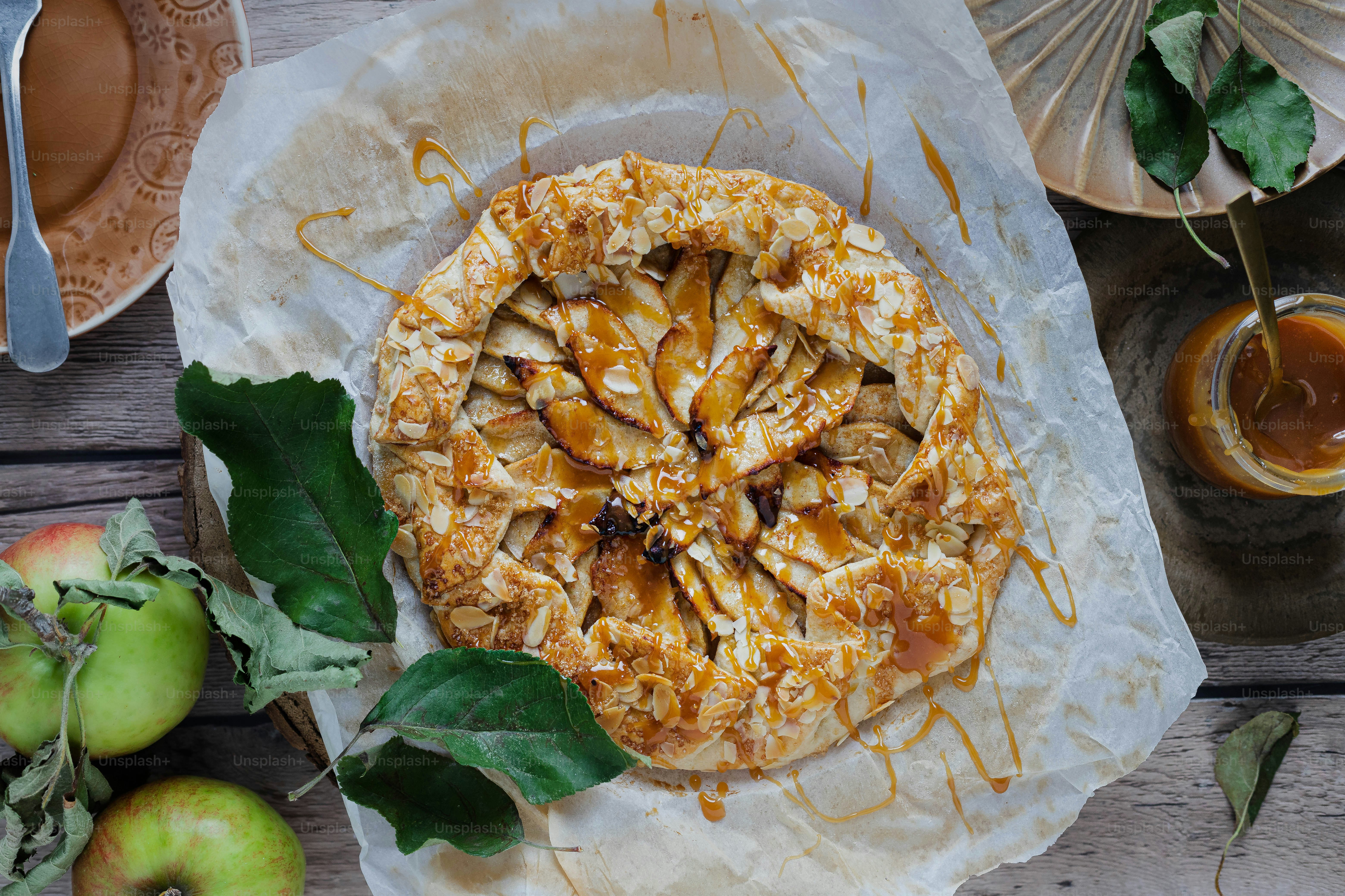 A pie sitting on top of a piece of wax paper photo – Freshly baked ...